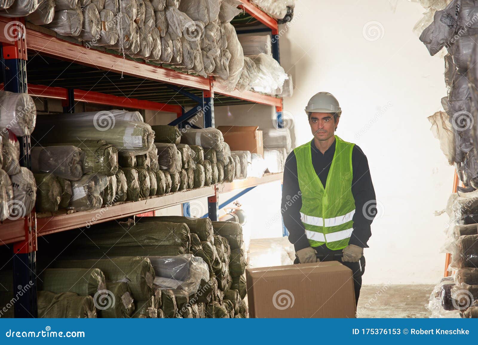 Warehouse Worker As a Packager with a Package Stock Image - Image of ...