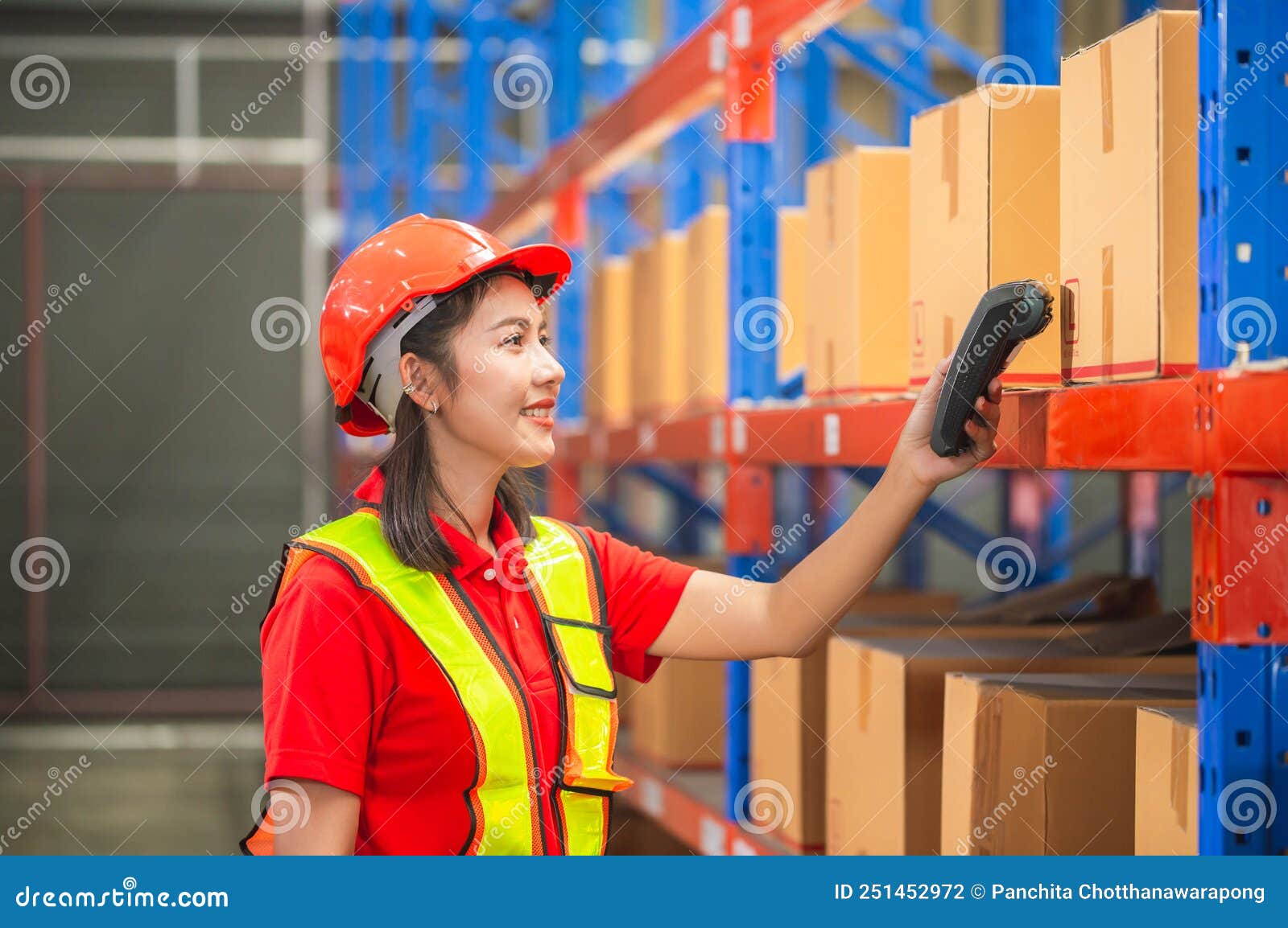 Warehouse Worker with Bar Code Scanner Checking Inventory, Female ...
