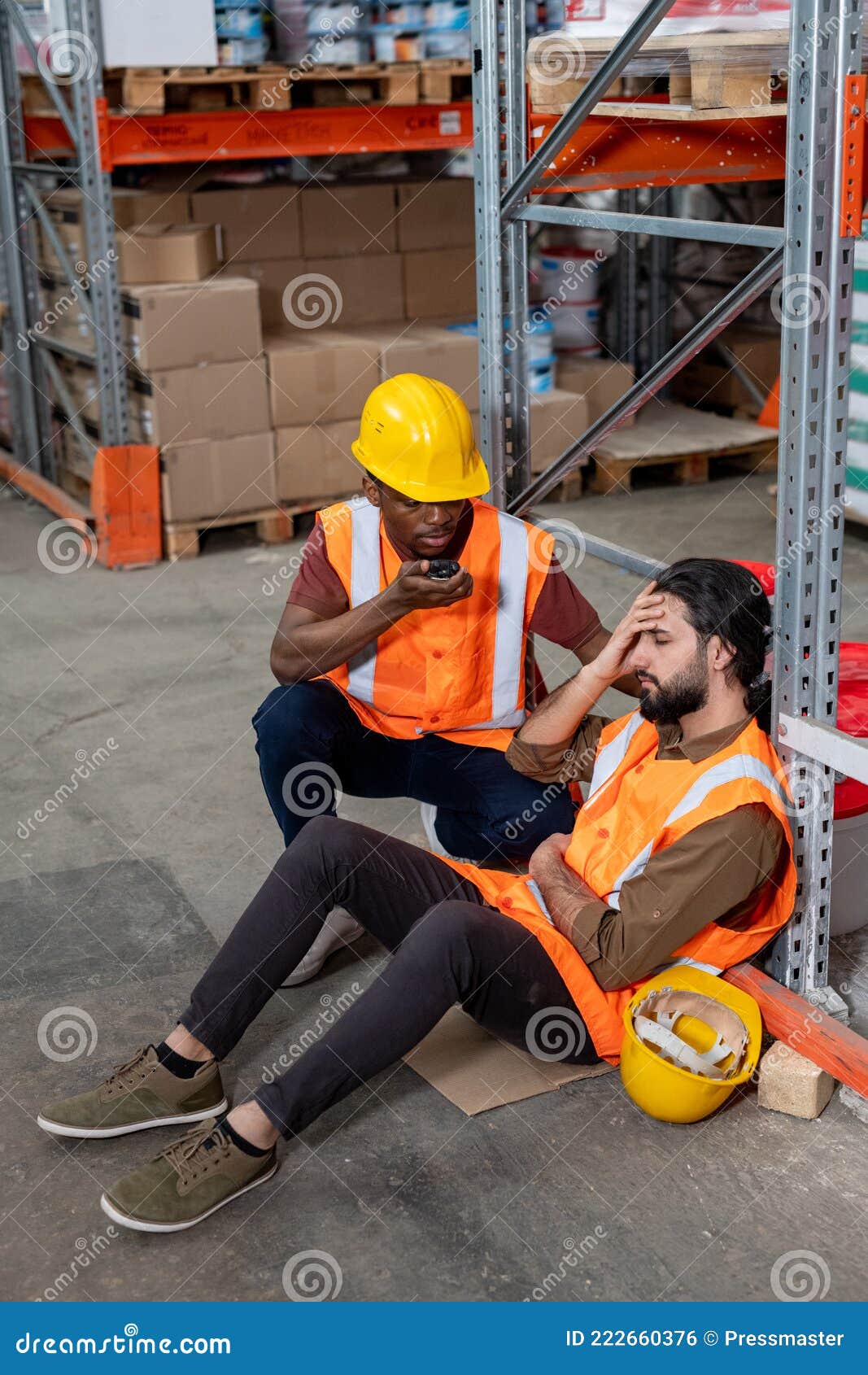 Warehouse Worker Calling Doctor for Sick Loader Stock Photo - Image of ...