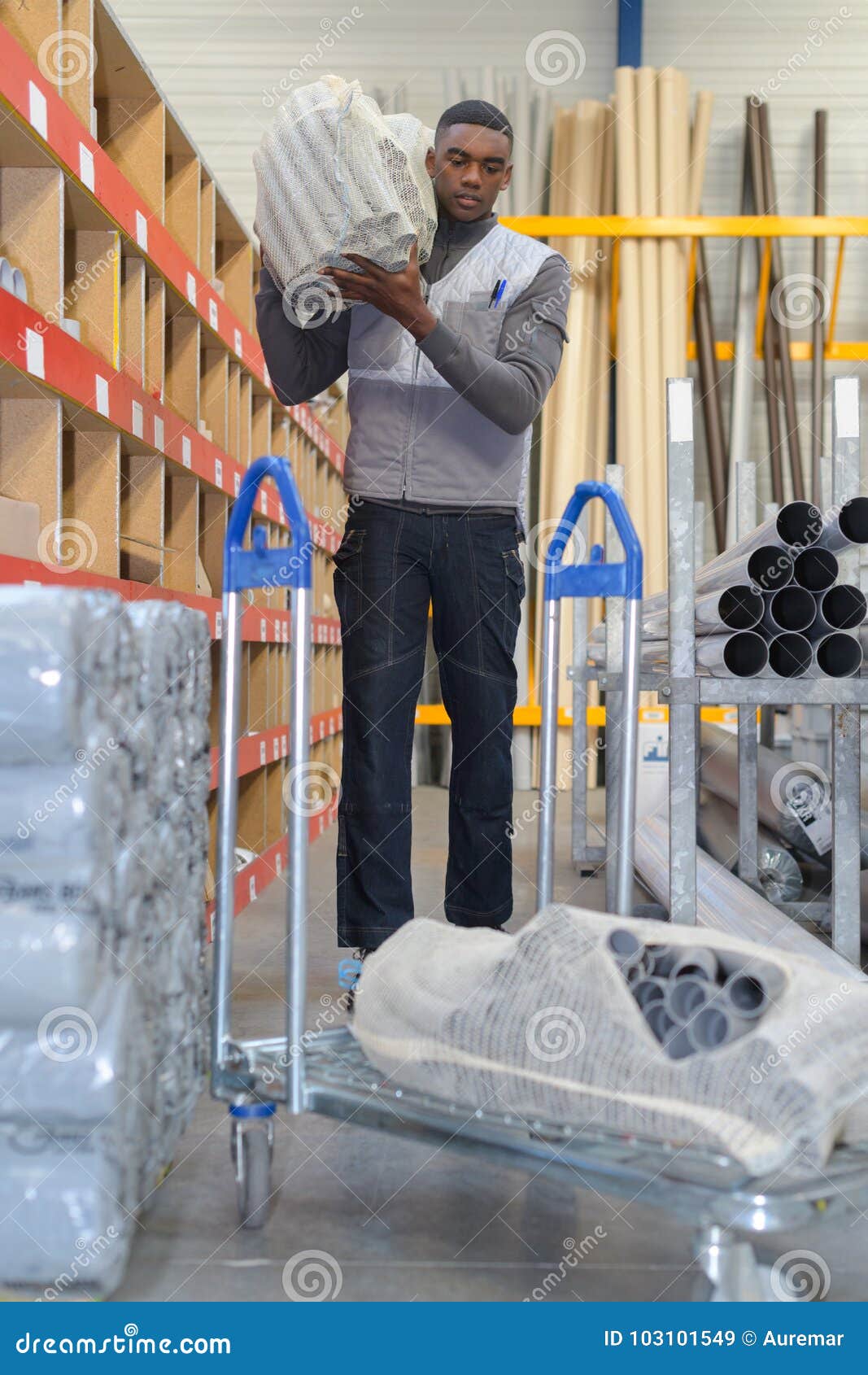 Warehouse Worker Carrying Box in Large Warehouse Stock Image - Image of ...