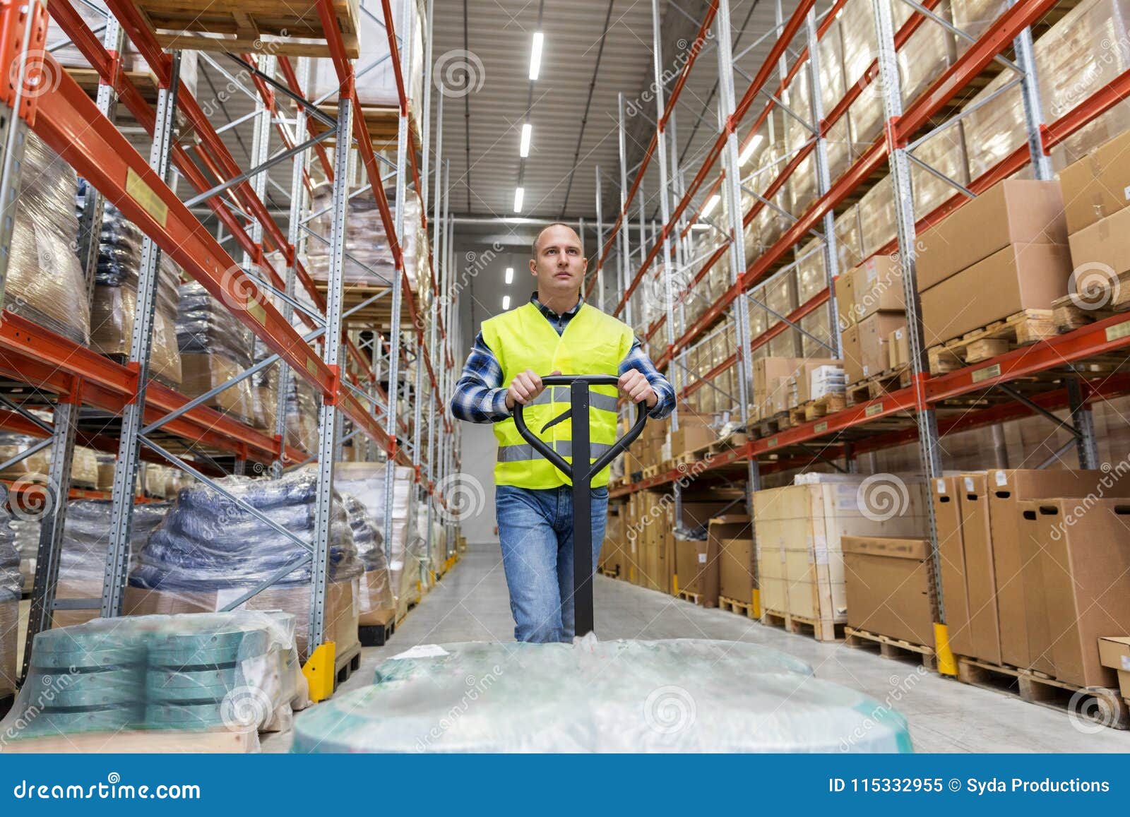 Warehouse Worker Carrying Loader with Goods Stock Image - Image of ...