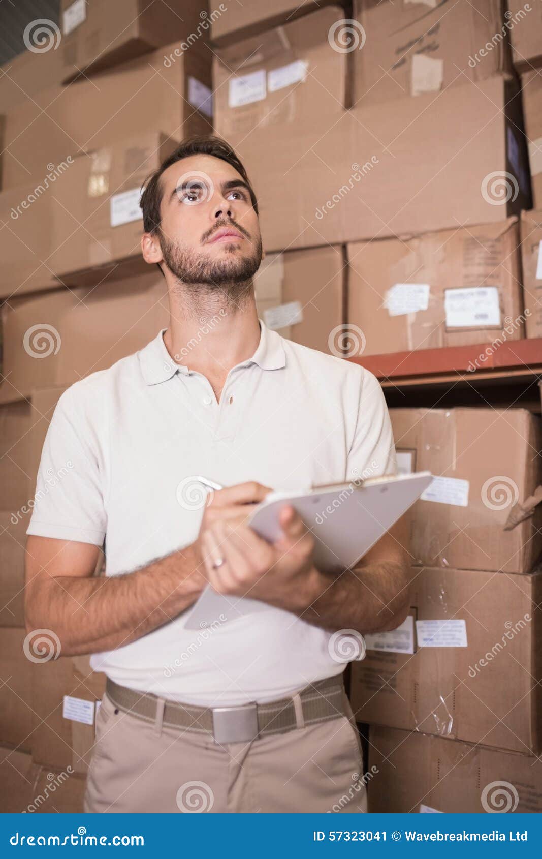 Warehouse Worker with Clipboard Stock Image - Image of indoors ...