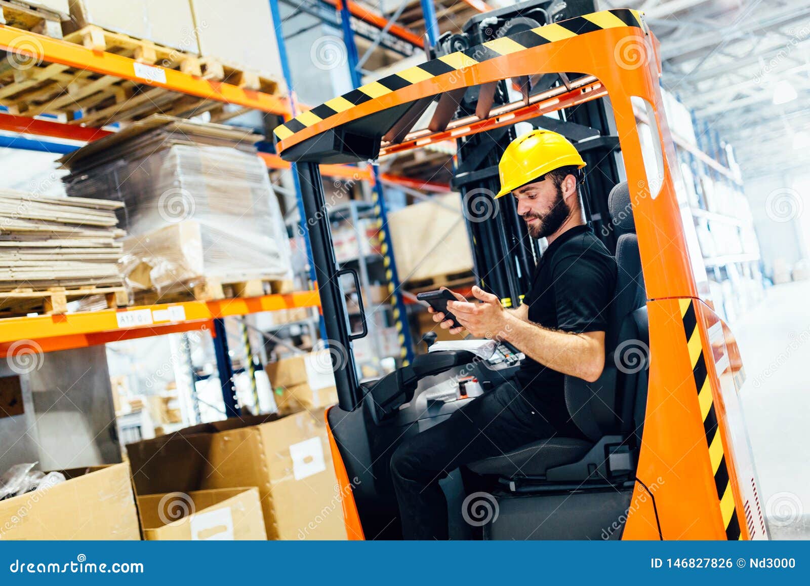 Warehouse Worker Doing Logistics Work with Forklift Loader Stock Photo ...
