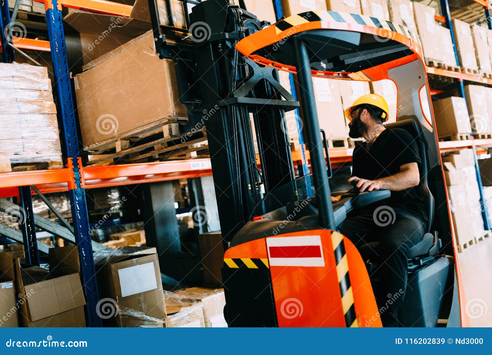 Warehouse Worker Doing Logistics Work with Forklift Loader Stock Image ...