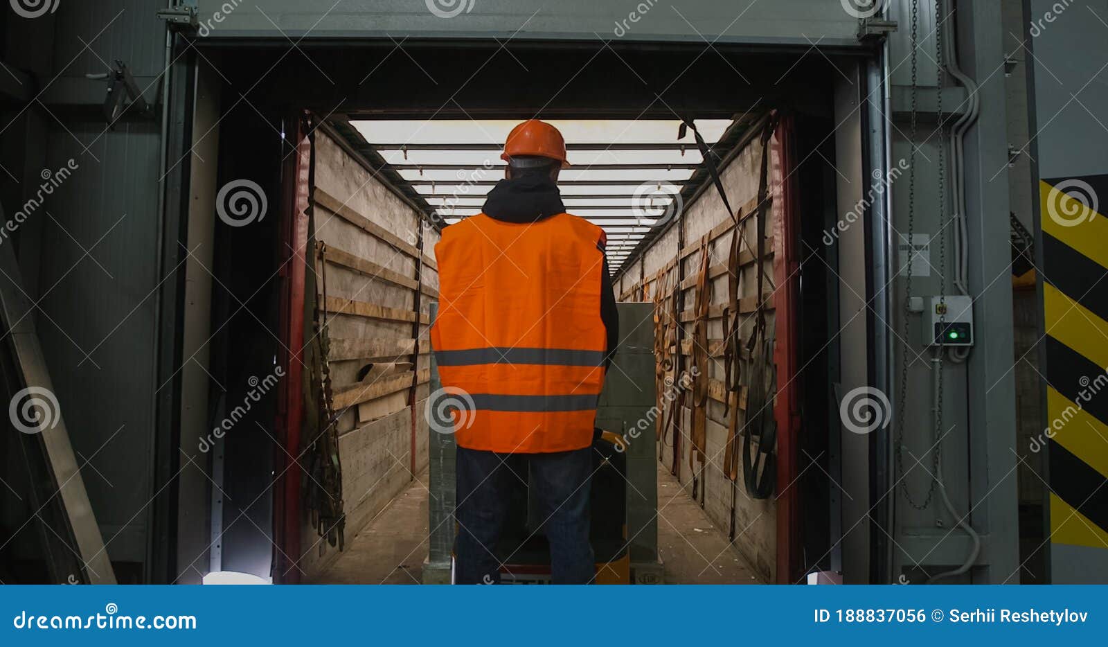 Warehouse Worker Driver in Uniform Loading Cardboard Boxes by Forklift ...