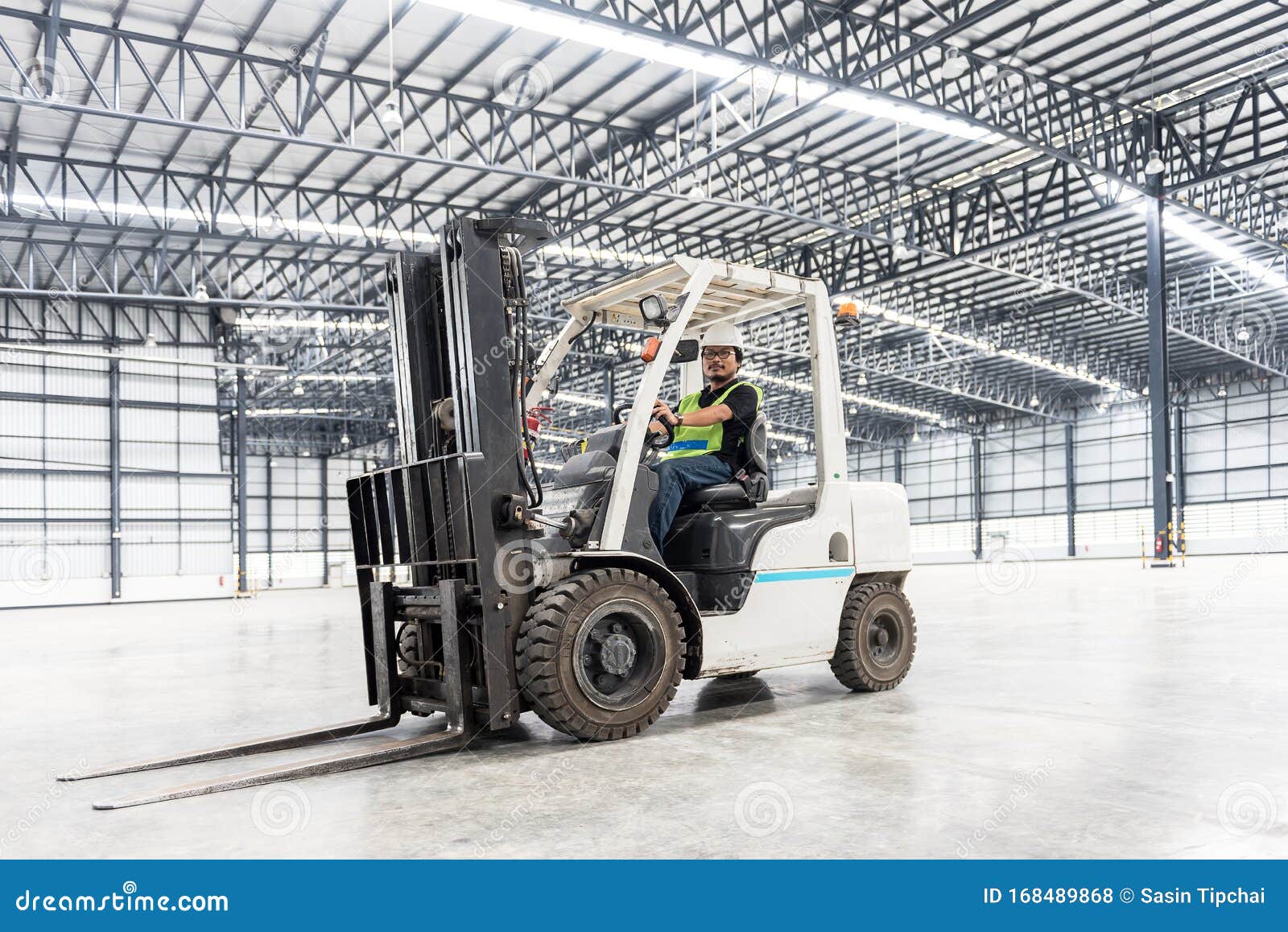 Warehouse worker driver stock photo. Image of rack, forklift - 168489868