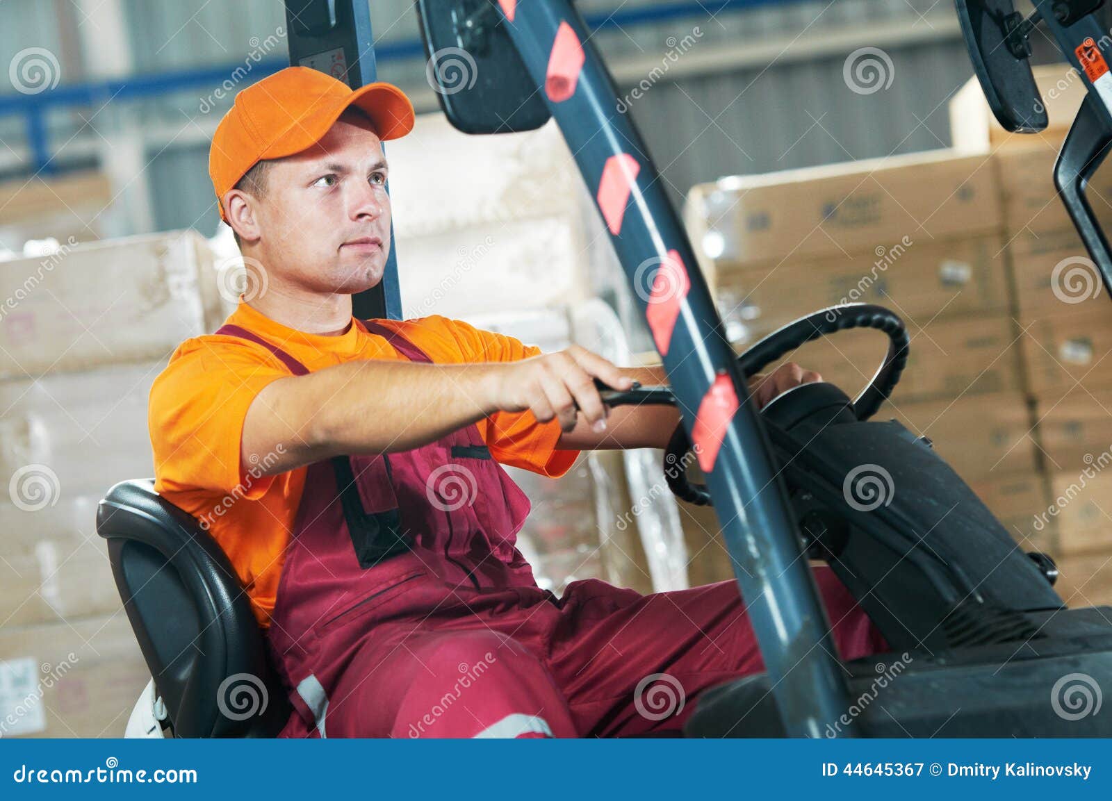 Warehouse Worker Driving Forklift Stock Image - Image of smiling ...