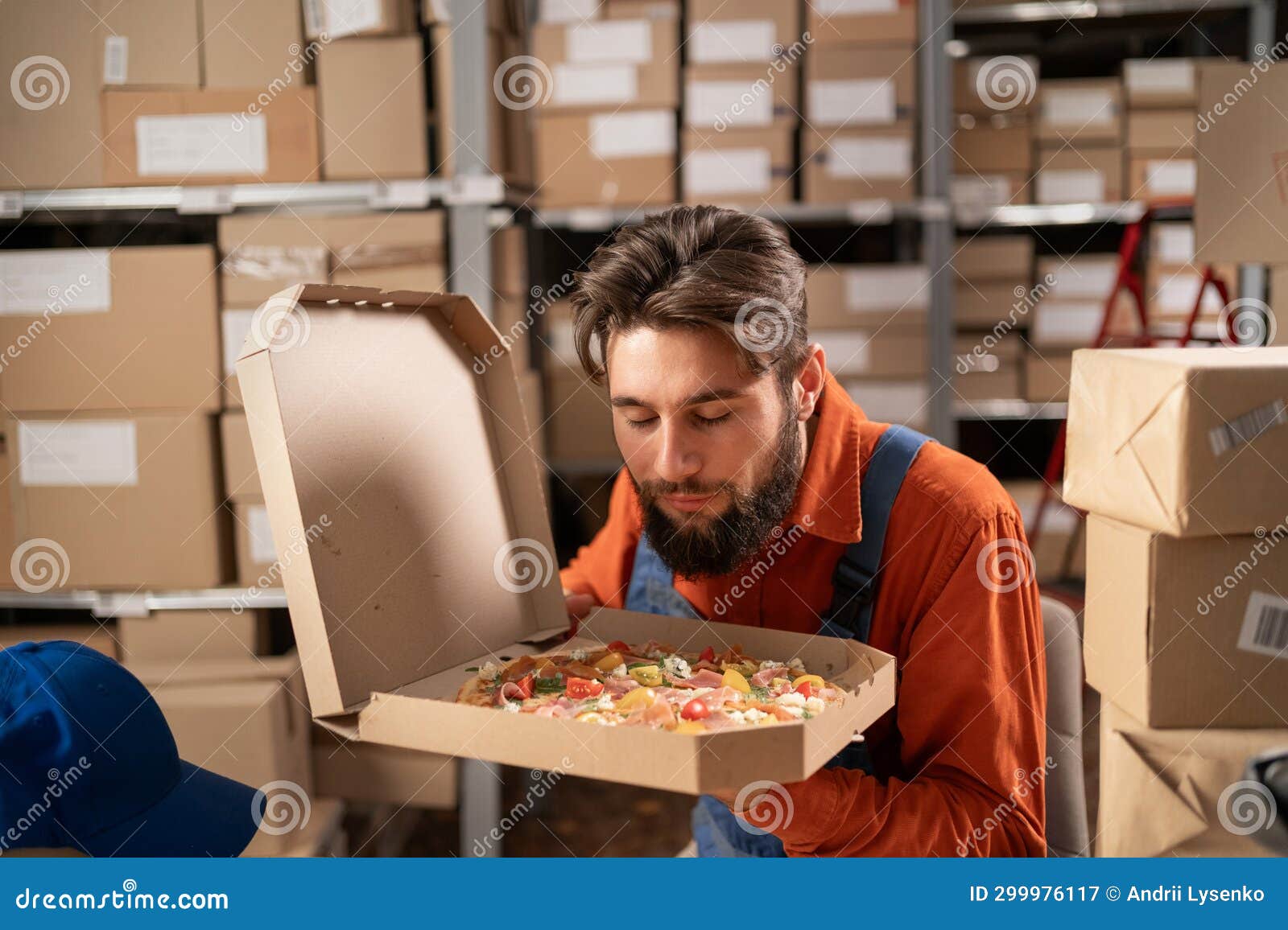 Warehouse Worker Eating Pizza for Lunch. Pizza Delivery Concept Stock ...