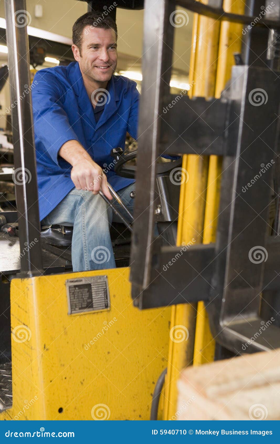 Warehouse Worker in Forklift Stock Photo - Image of forklift, operator ...