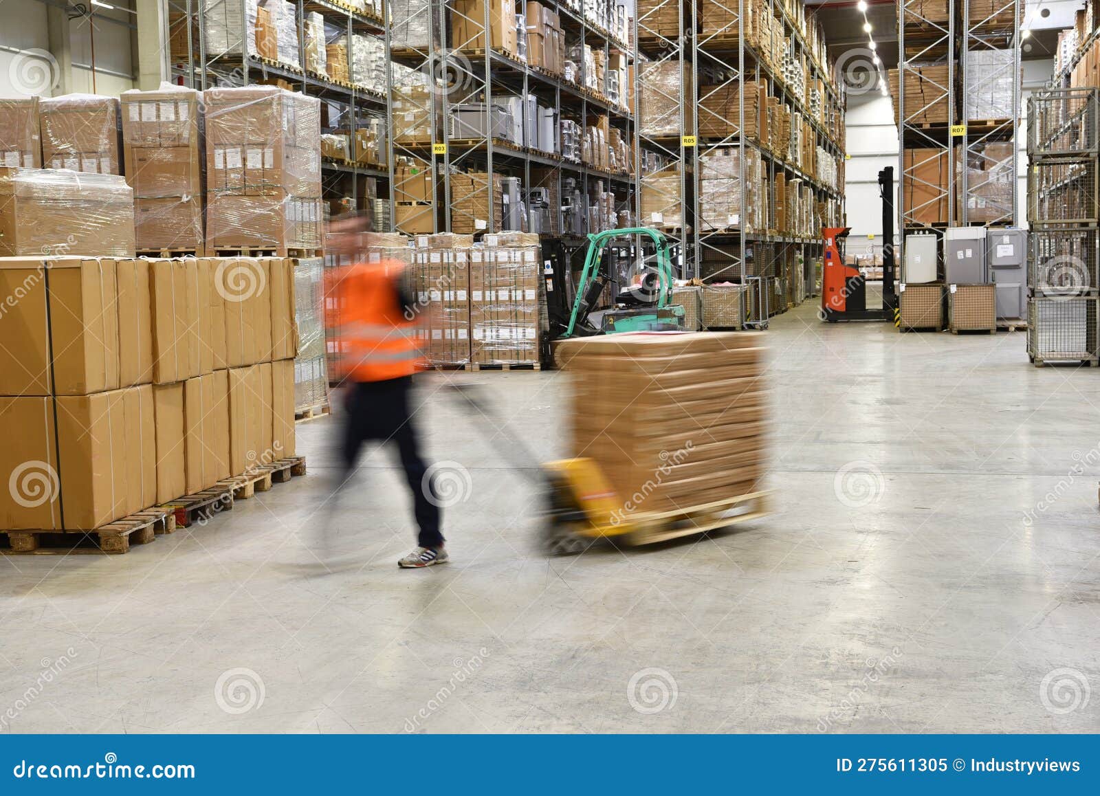 Warehouse Worker in a Forwarding Agency - Interior with Forklift ...