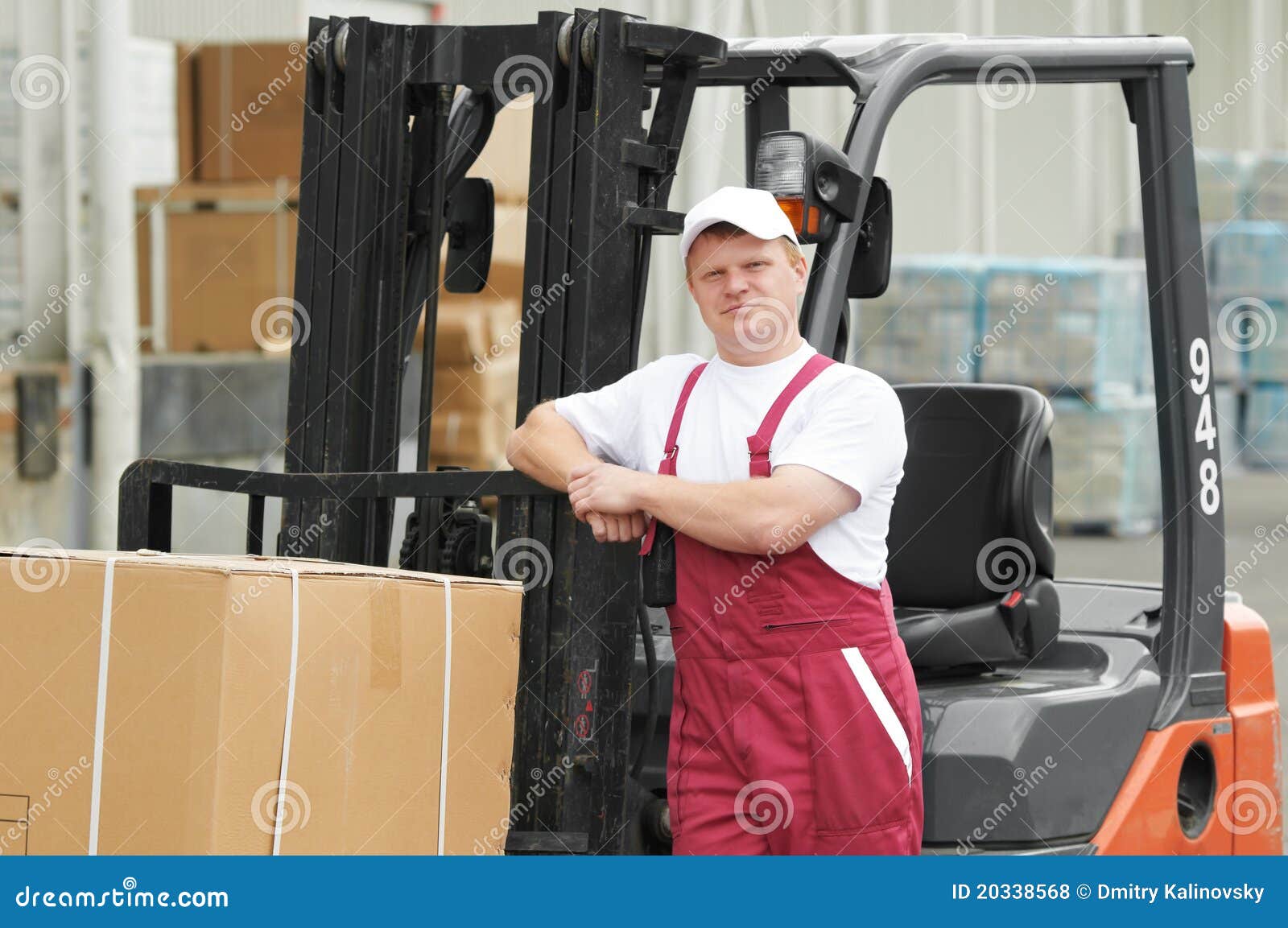 Warehouse worker in front stock photo. Image of handling - 20338568