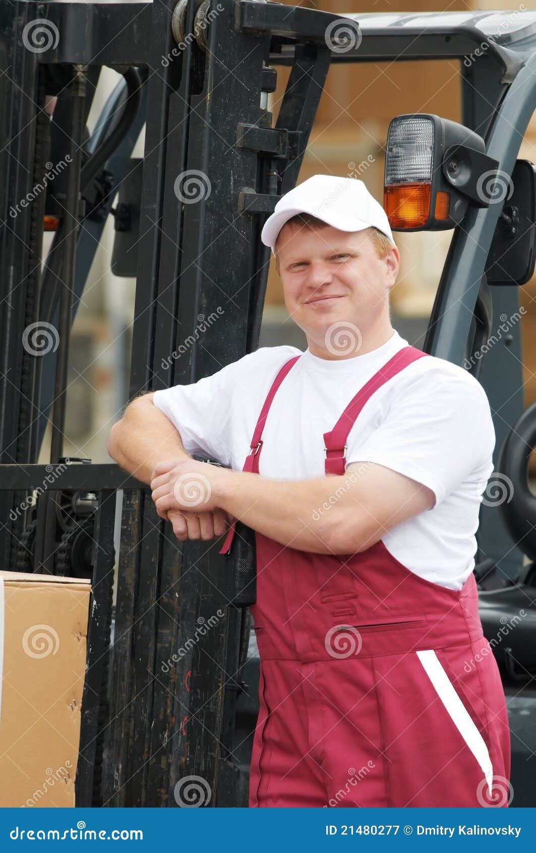 Warehouse Worker in Front of Forklift Stock Image - Image of cheerful ...