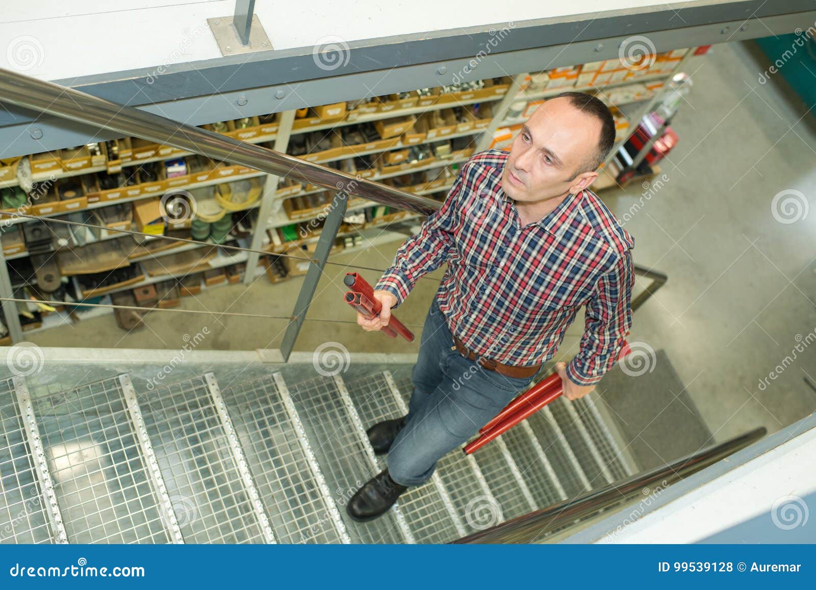 Warehouse Worker Going Up Stairs Stock Photo - Image of outside, mail ...