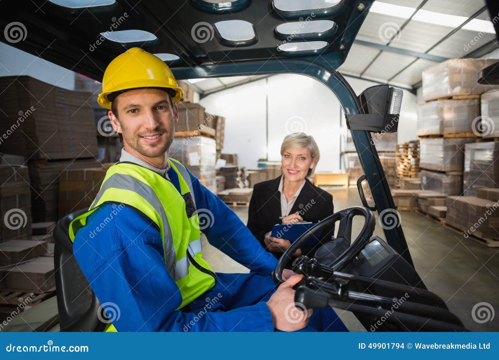 Warehouse Worker and His Manager Smiling at Camera Stock Photo - Image ...
