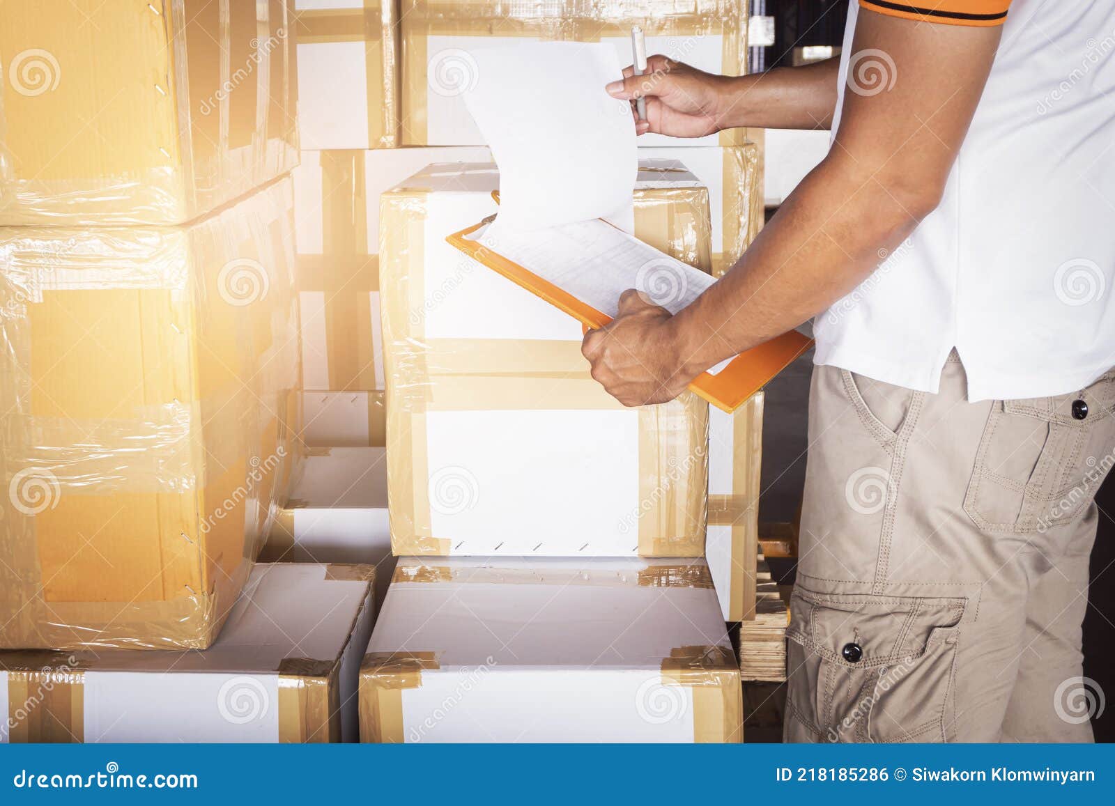 Warehouse Worker Holding Clipboard Doing Inventory Management Package ...