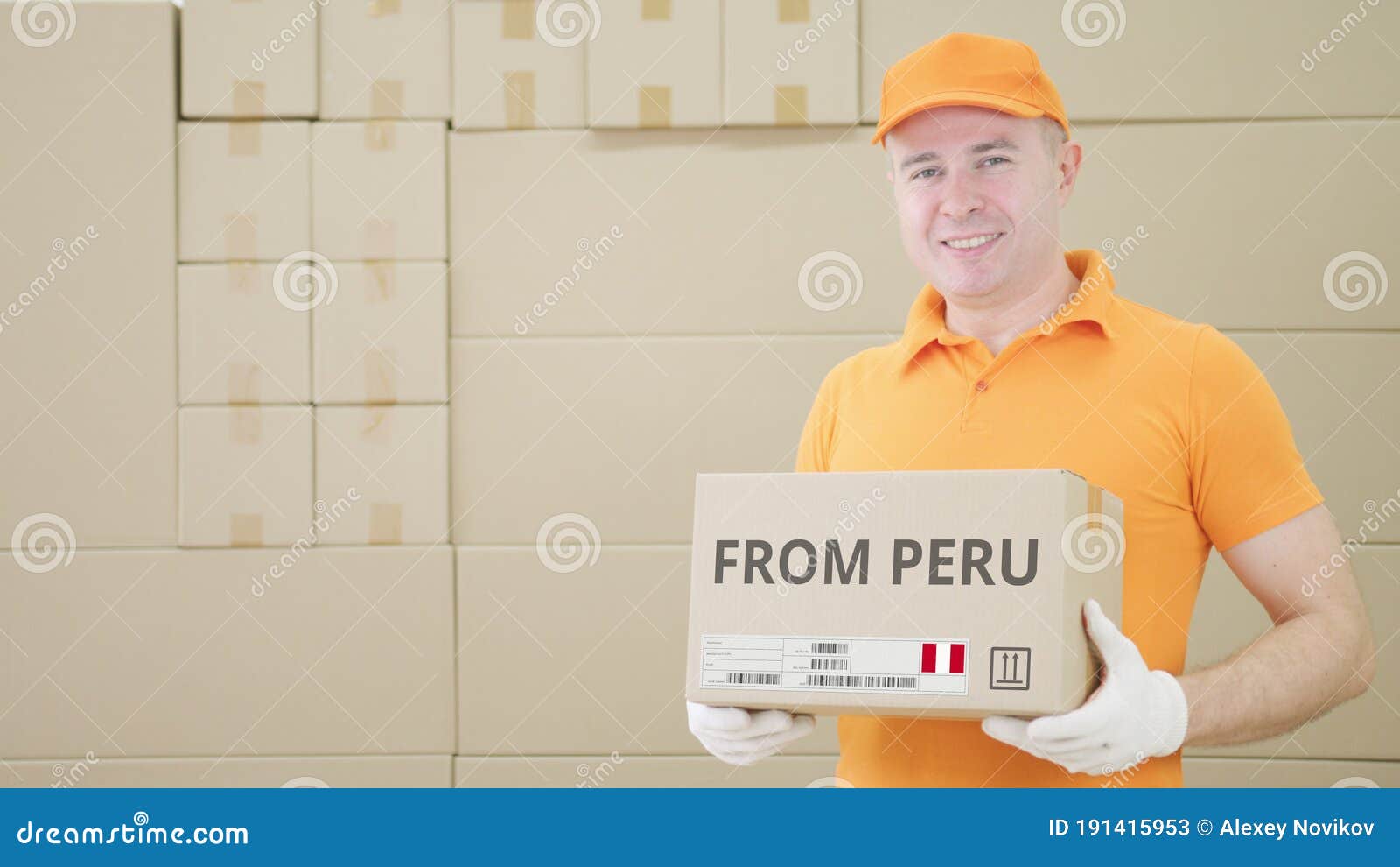 Warehouse Worker Holds Cardboard Box with Printed from PERU Text on it ...