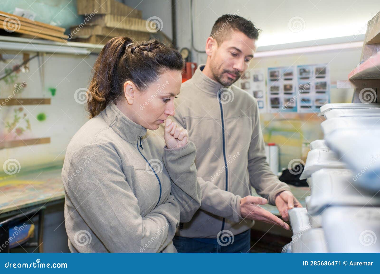 Warehouse Worker and Manager Looking at Something Stock Image - Image ...