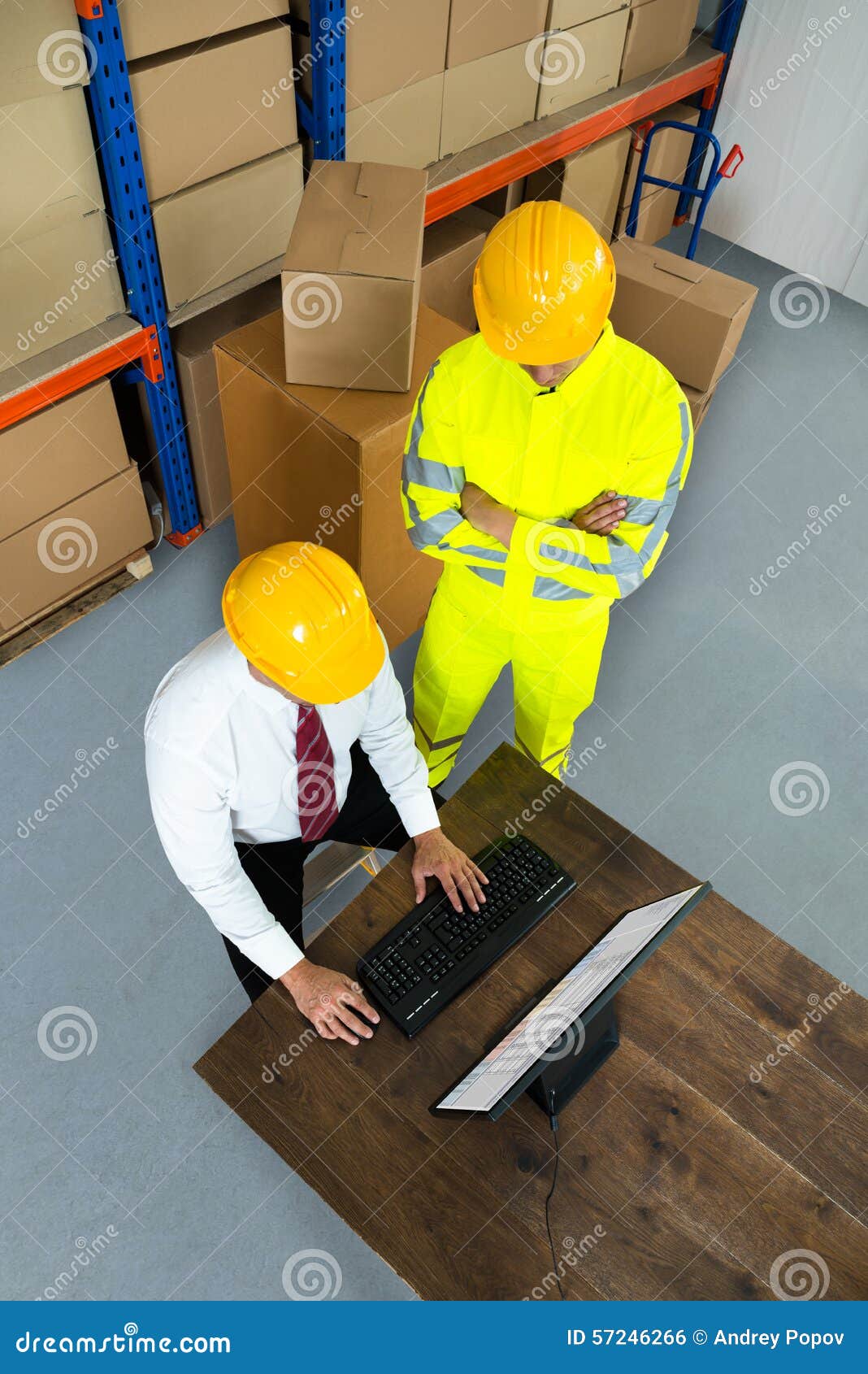 Warehouse Worker and Manager Using Computer Stock Photo - Image of ...