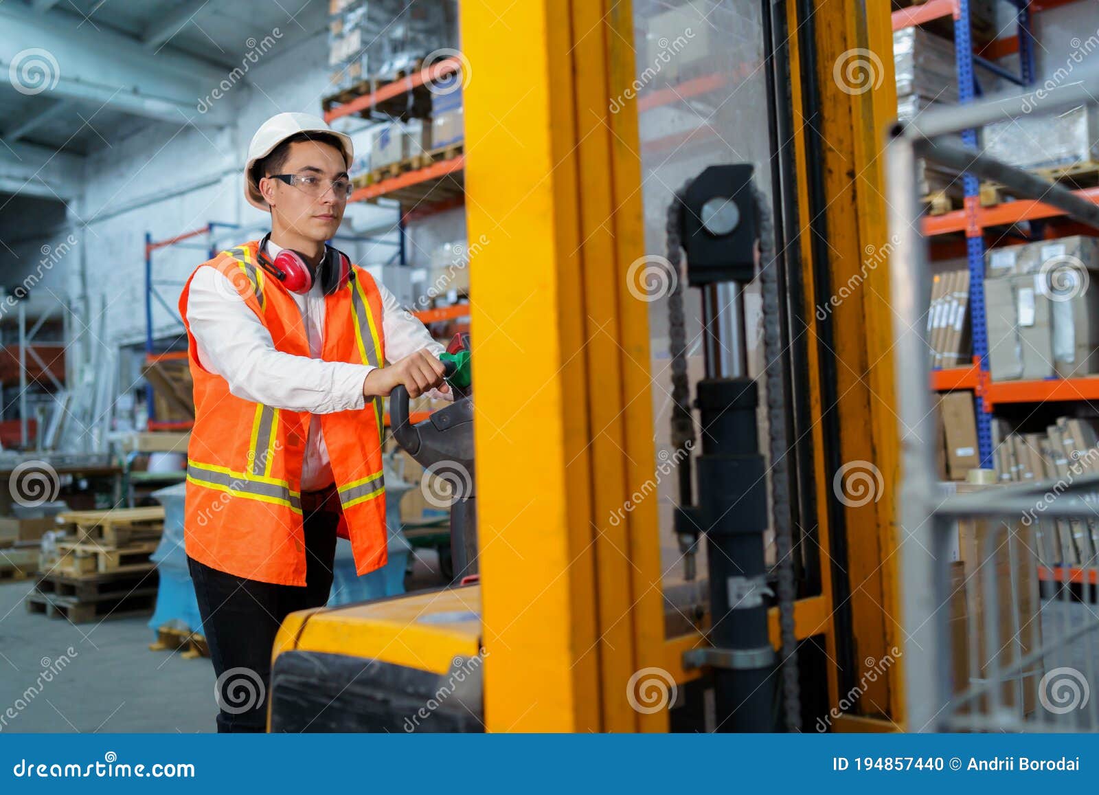 Warehouse Worker Operates a Pallet Loader. Stock Photo - Image of shelf ...