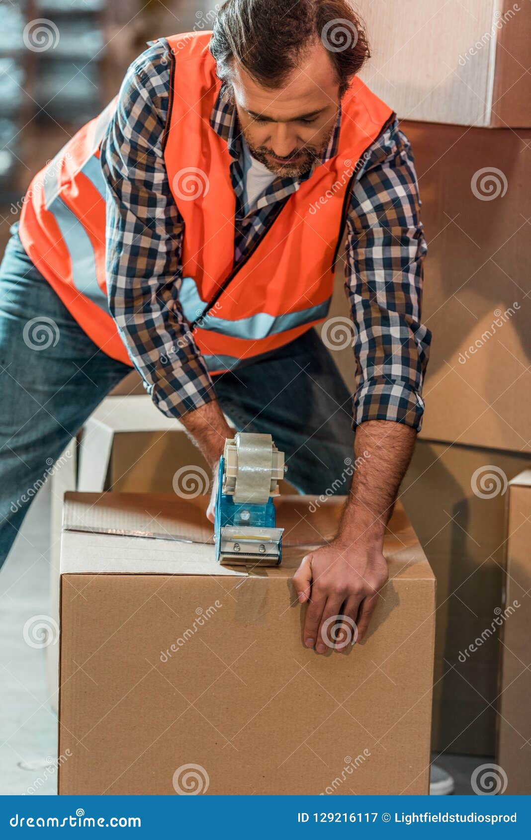 Male Warehouse Worker Packing Box Stock Image - Image of packages, work ...