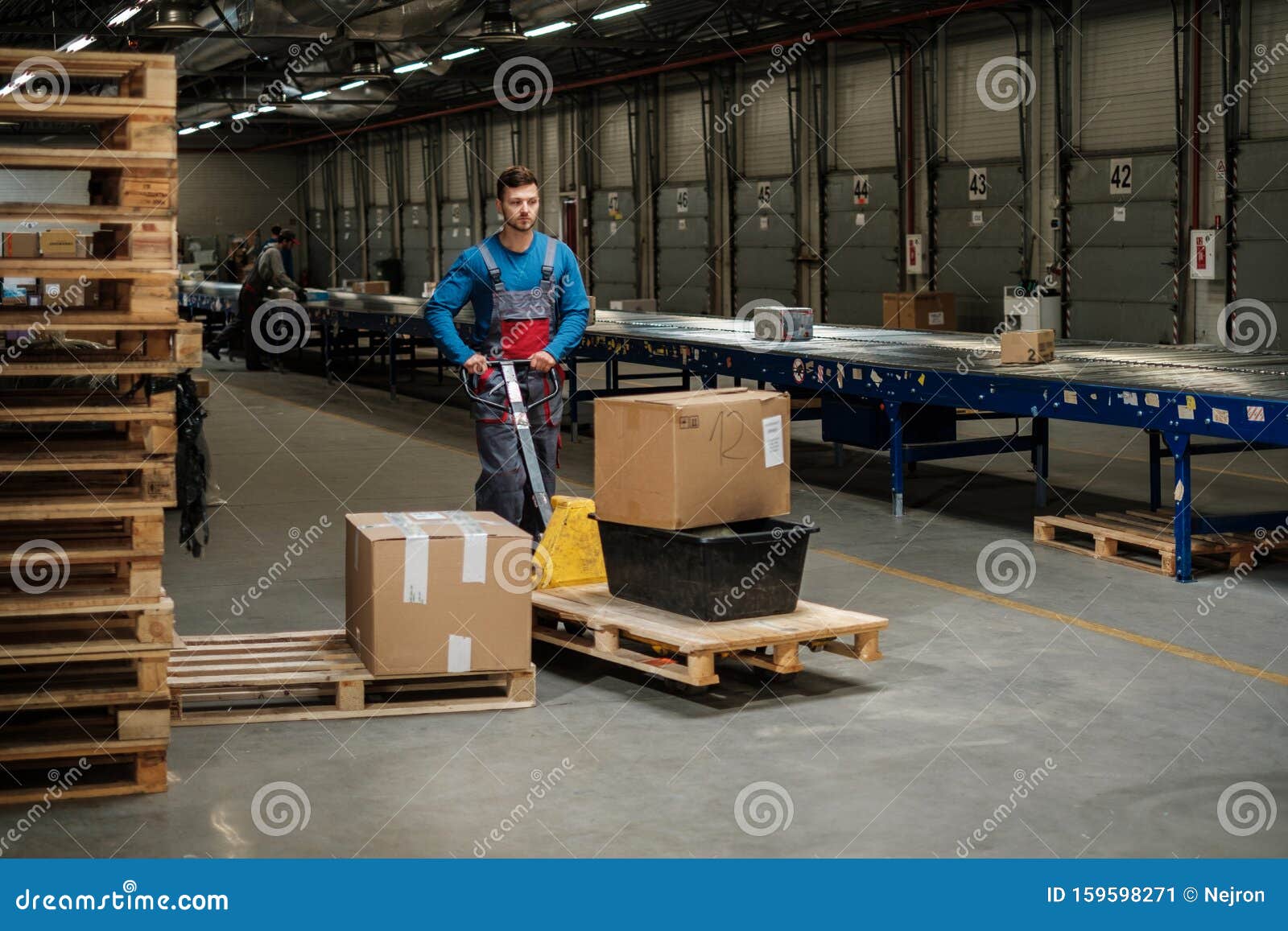 Warehouse Worker with a Pallet Rack Stock Image - Image of crates ...