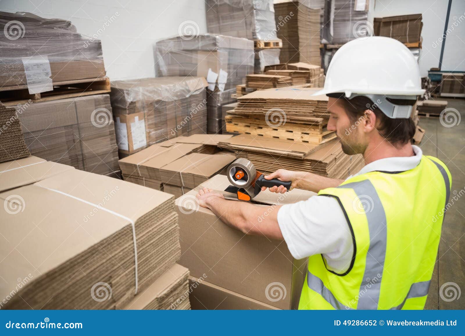 Warehouse Worker Preparing a Shipment Stock Photo - Image of occupation ...