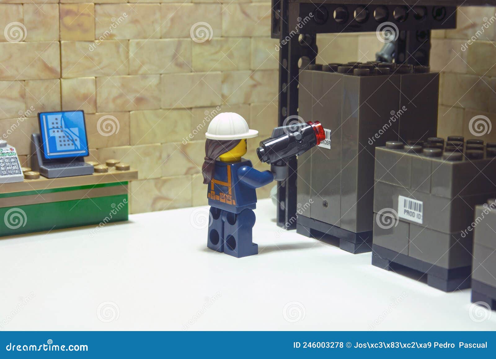 Warehouse Worker, Reading a Label Automatically with a Reader Device on ...