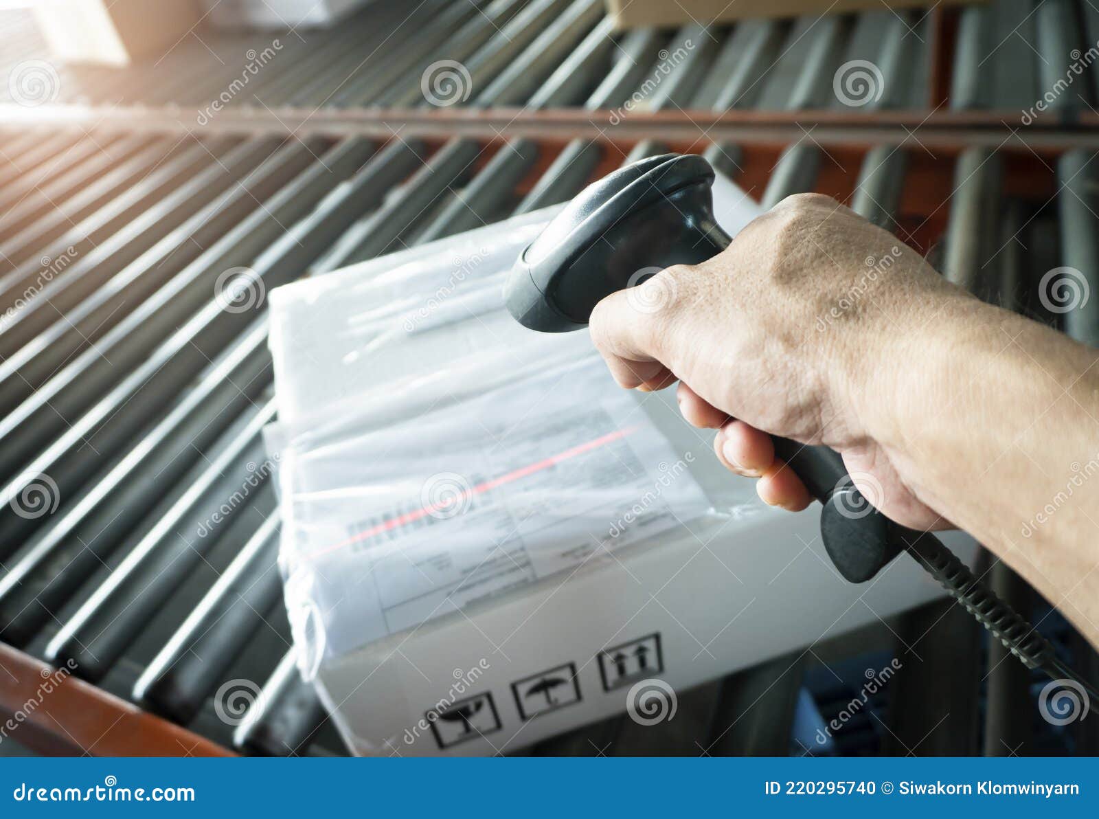 Warehouse Worker Scanning Bar Code Scanner on Package Boxes. Stock ...