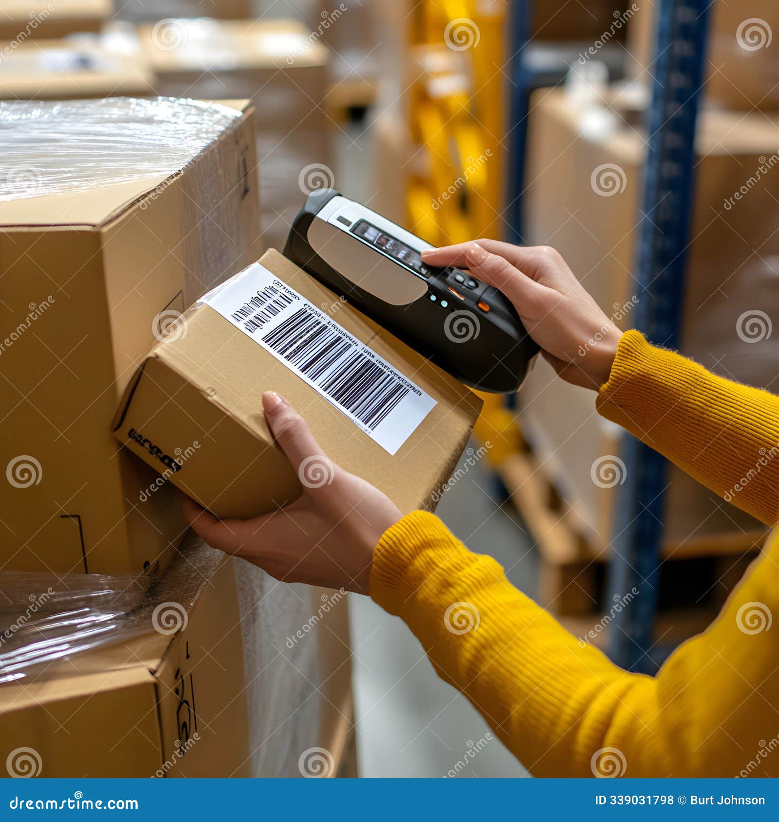 Warehouse Worker Scanning Barcode on Package for Delivery Stock ...