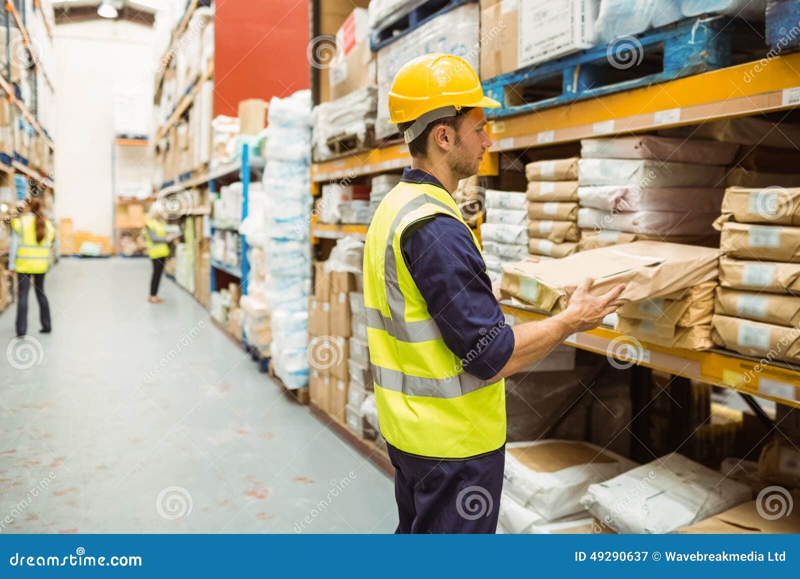 Warehouse Worker Taking Package in the Shelf Stock Image - Image of ...