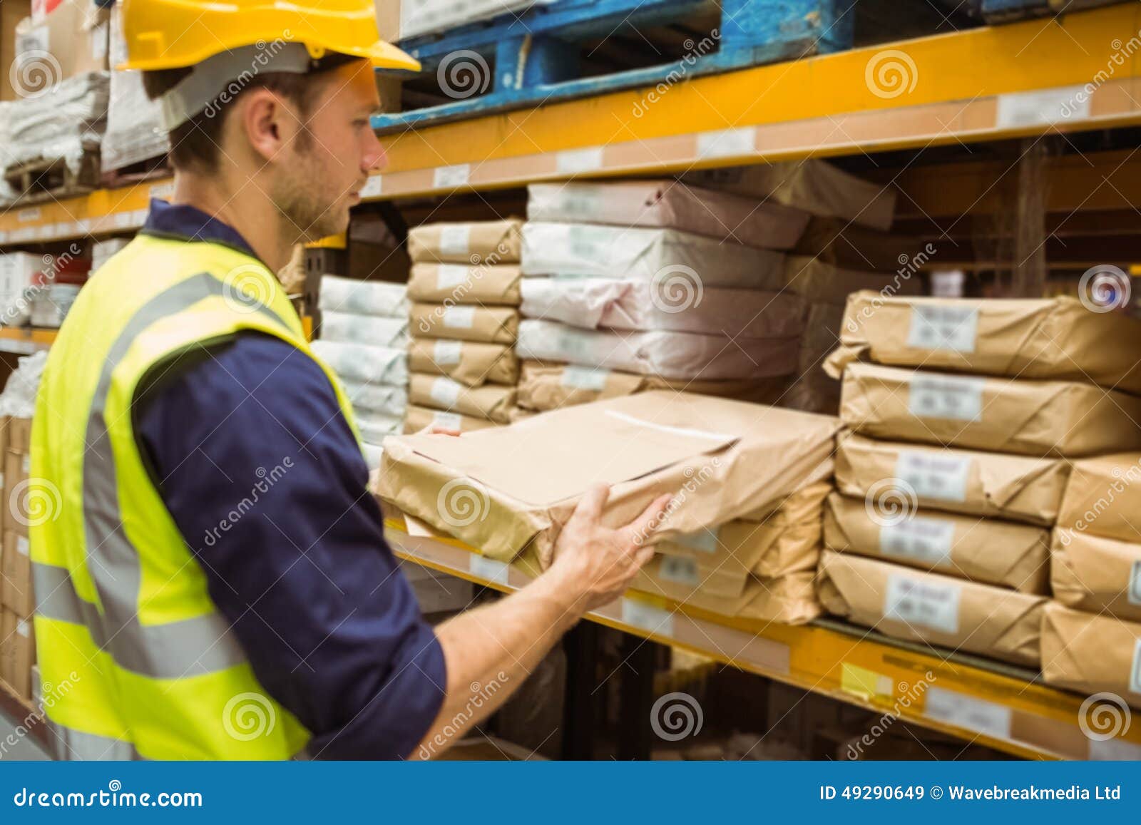 Warehouse Worker Taking Package in the Shelf Stock Image - Image of ...