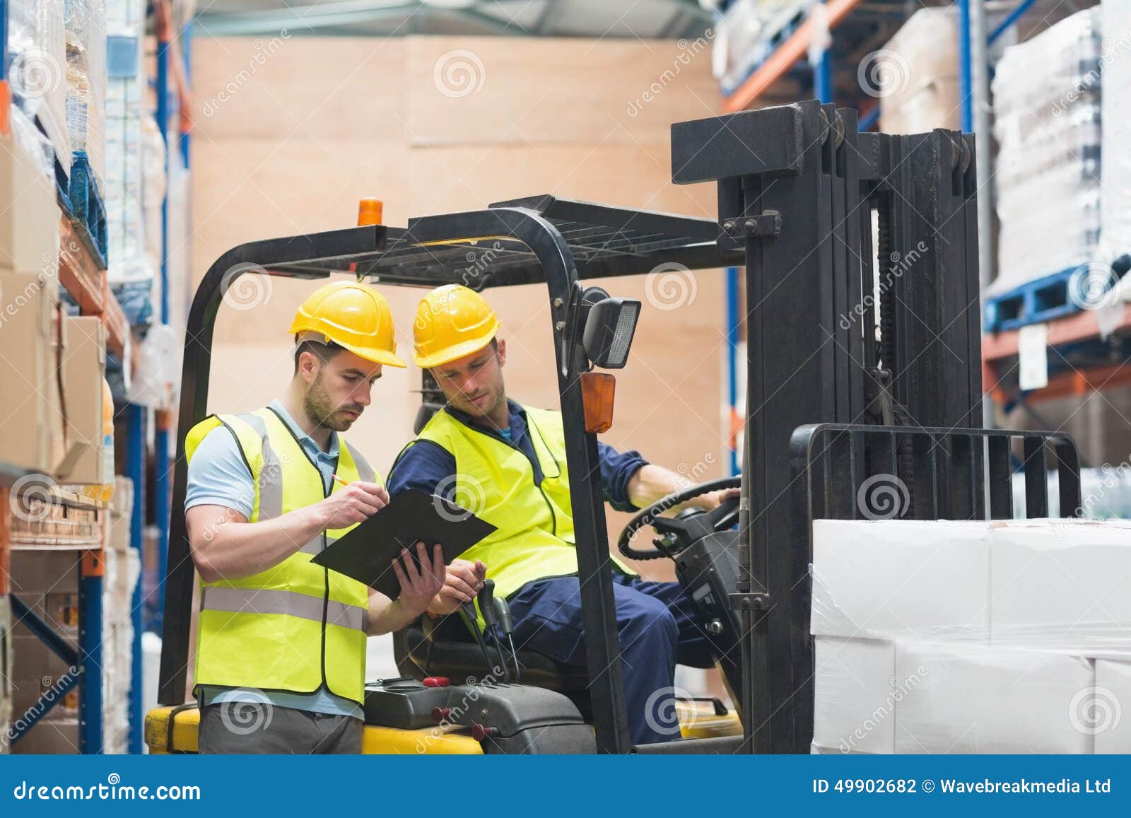 Warehouse Worker Talking with Forklift Driver Stock Photo - Image of ...