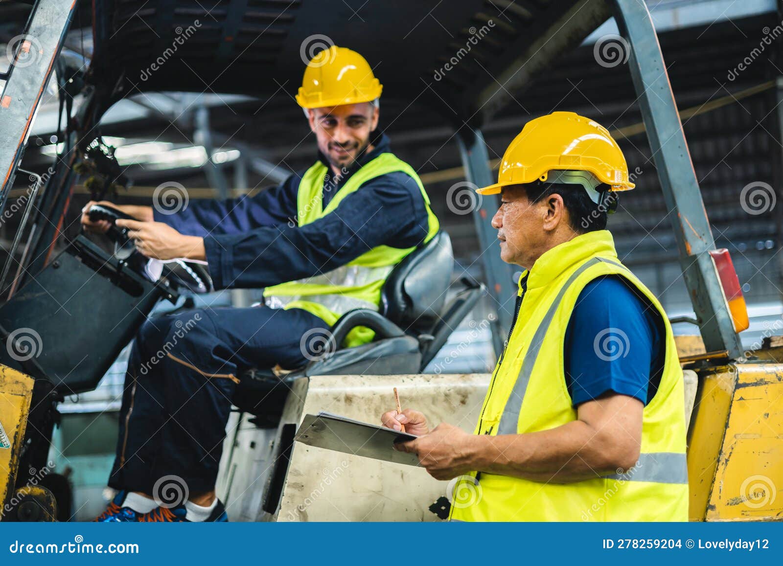Warehouse Worker Talking with Forklift Operator in Factory Stock Photo ...
