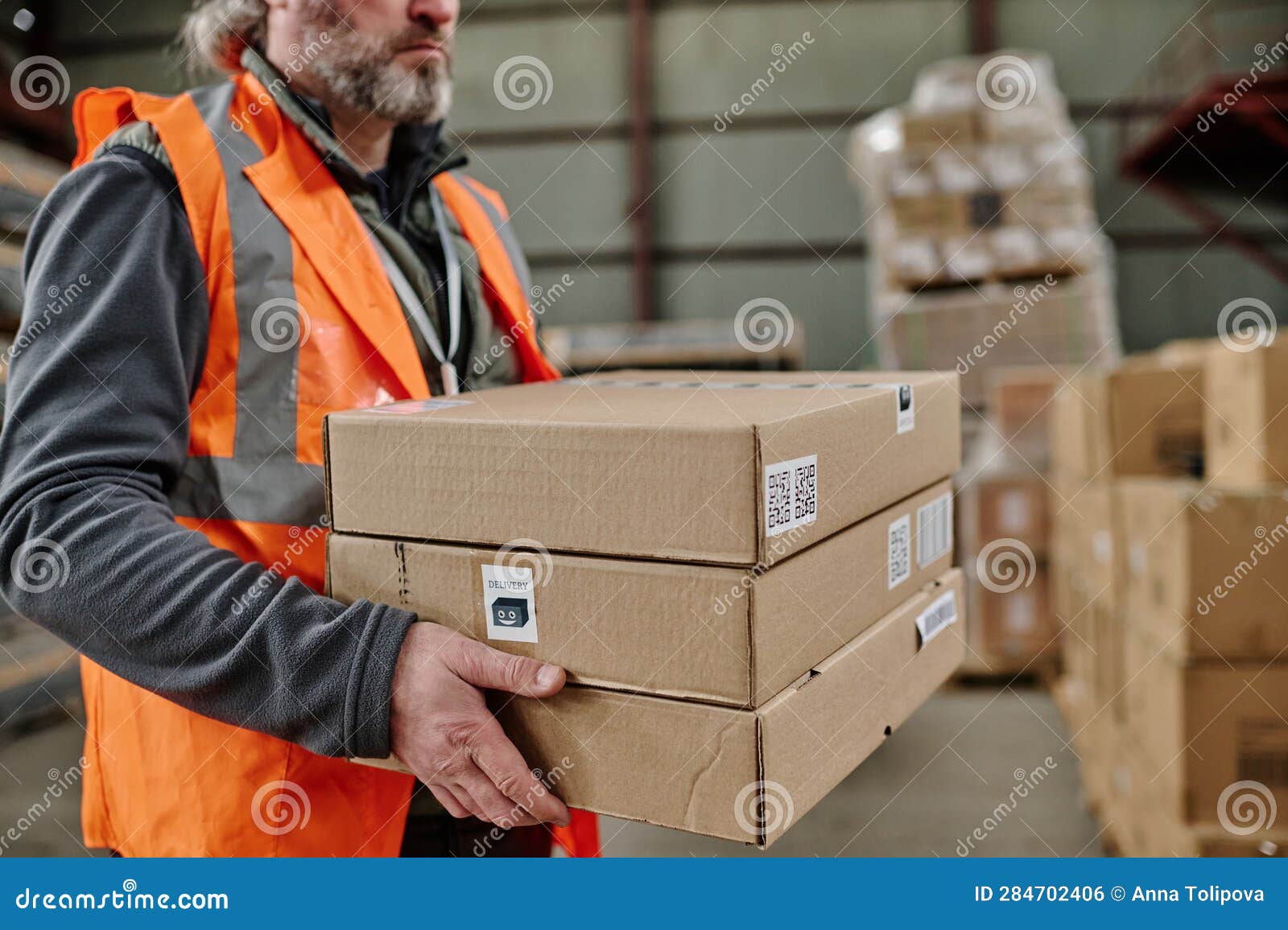 Warehouse Worker Unloading Goods in Storehouse Stock Photo - Image of ...