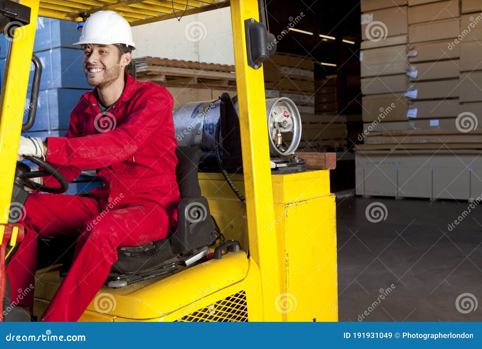 Warehouse Worker Using Forklift Truck Stock Image - Image of industry ...