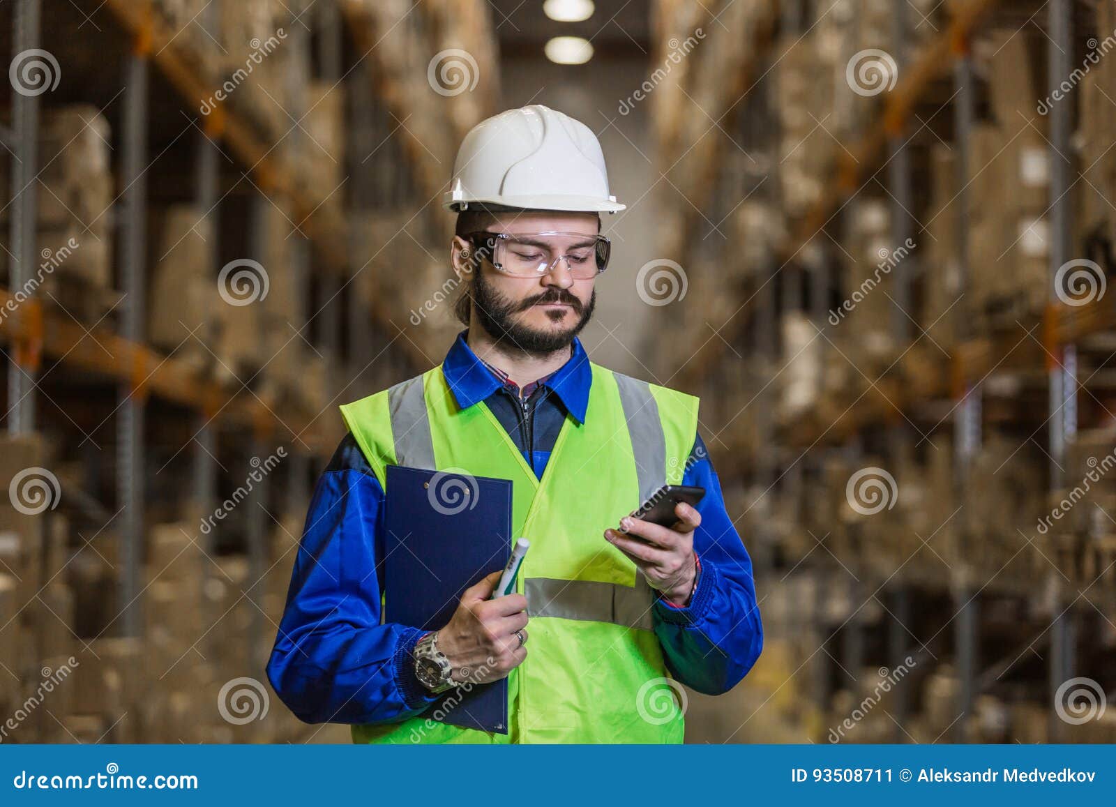 Warehouse Worker Using Mobile Phone Stock Image - Image of cellphone ...