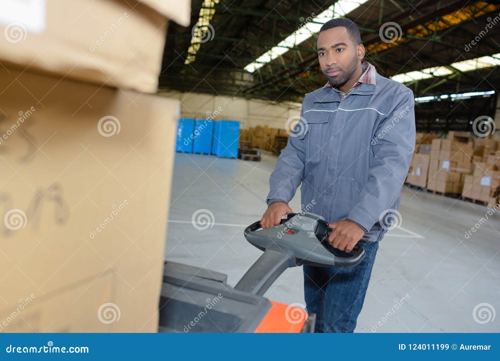 Warehouse Worker Using Pallet Truck Stock Image - Image of stockpile ...