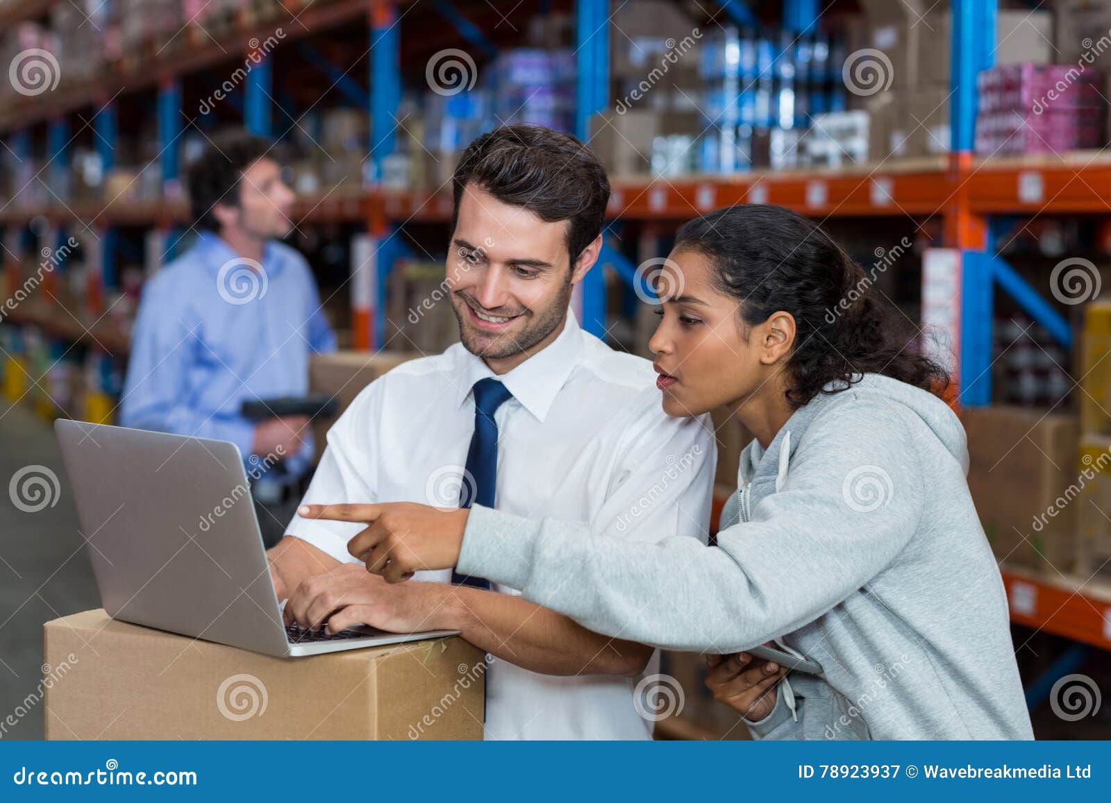 Warehouse Worker Working on Laptop Stock Image - Image of happy ...
