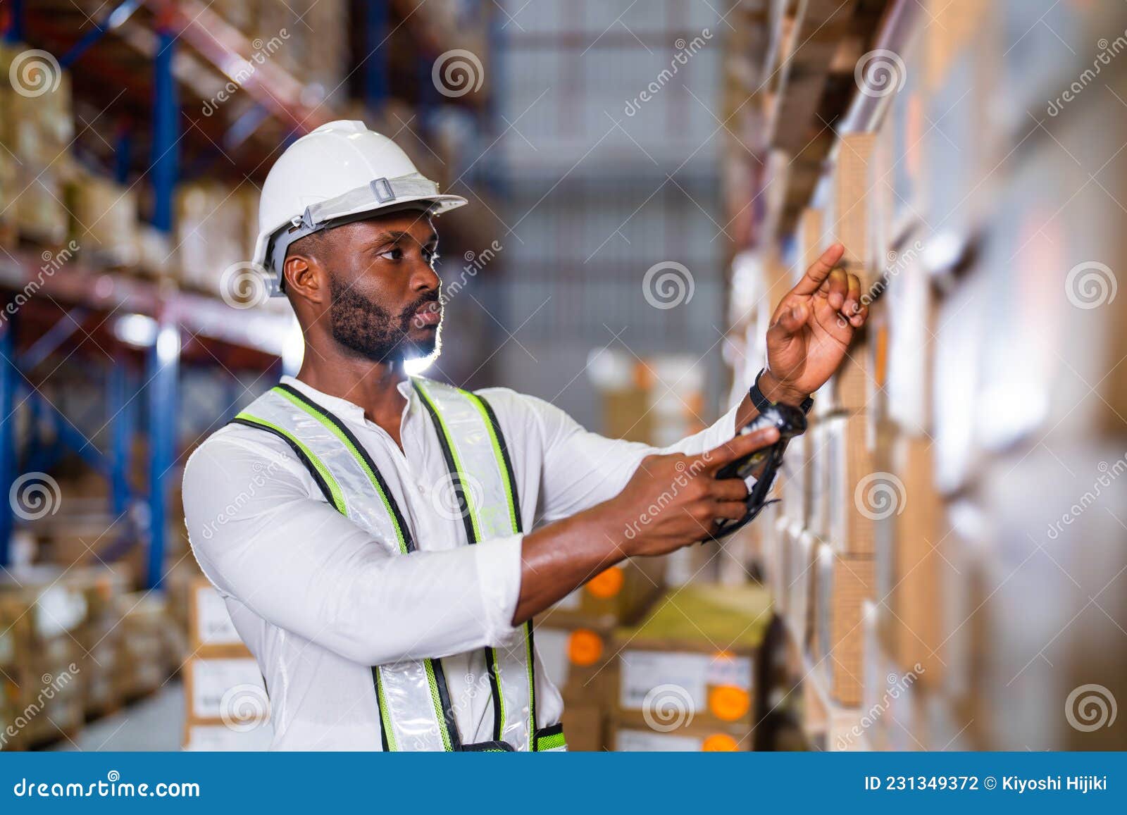 Warehouse Worker Working Process Checking the Package with a Barcode ...
