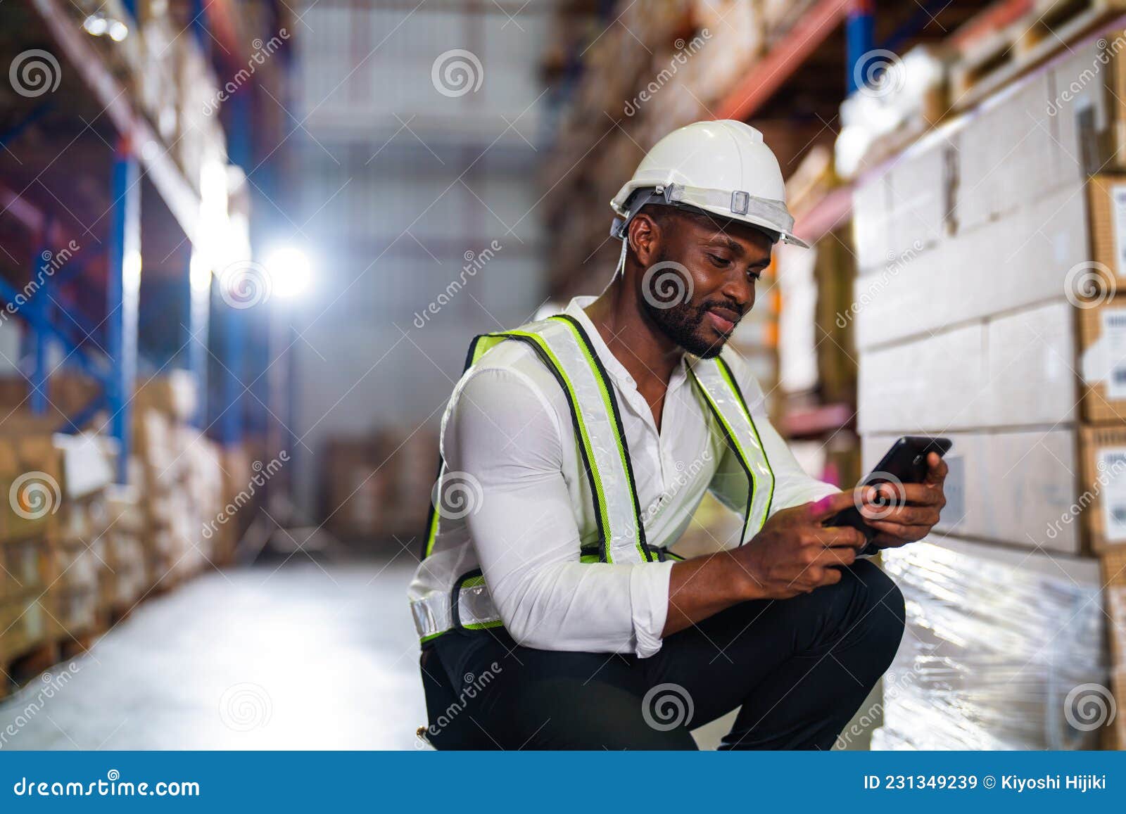 Warehouse Worker Working Process Checking the Package with a Tablet in ...
