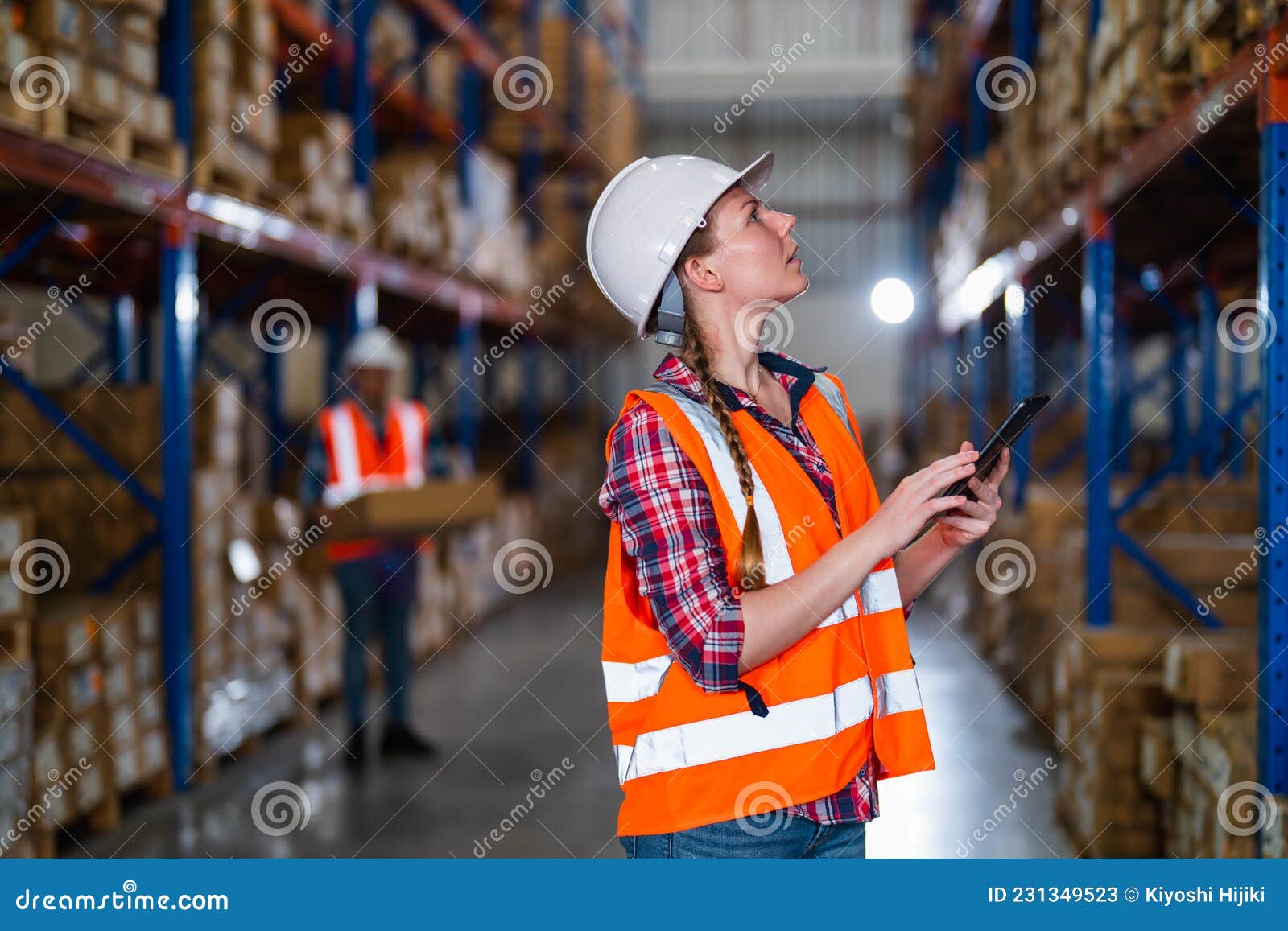 Warehouse Worker Working Process Checking the Package Using a Tablet in ...