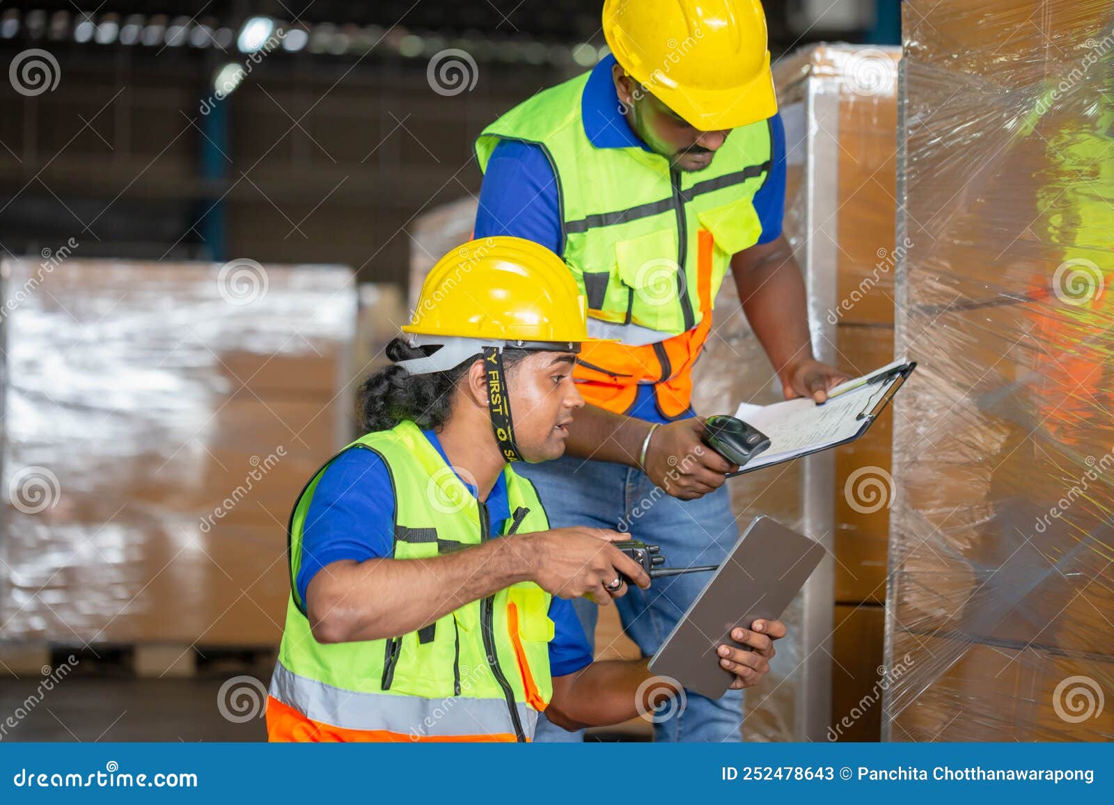 Warehouse Workers with Bar Code Scanner Checking Inventory, Forman ...