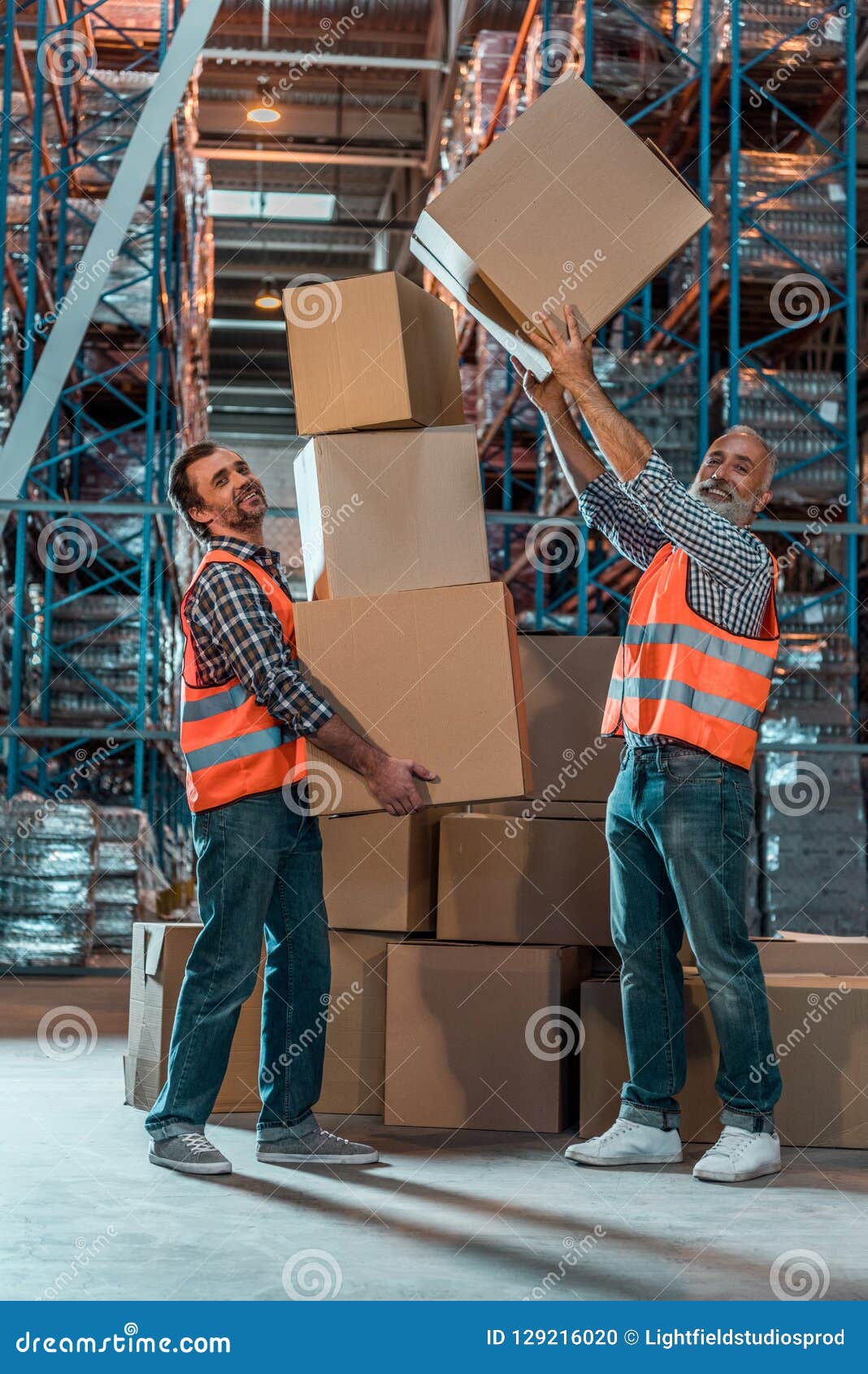 Warehouse Workers with Boxes Stock Photo - Image of full, caucasian ...