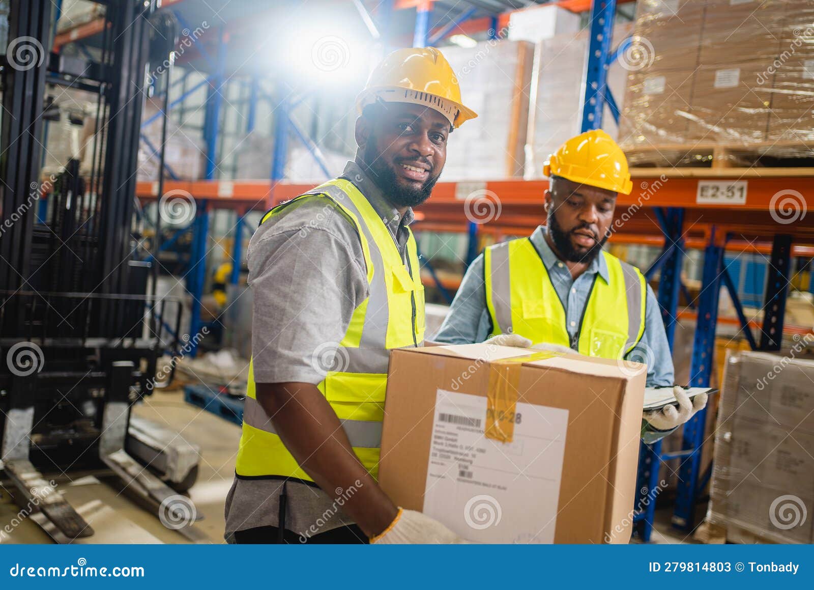 Warehouse Workers Checking and Controlling Boxes in Warehouse Stock ...
