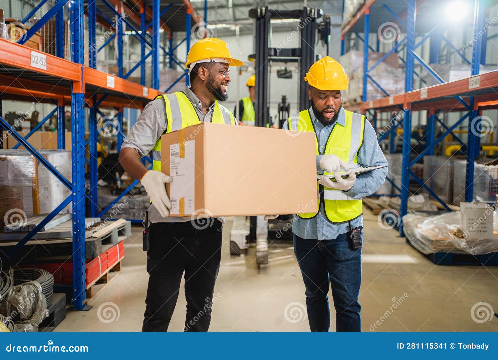 Warehouse Workers Checking and Controlling Boxes in Warehouse Stock ...