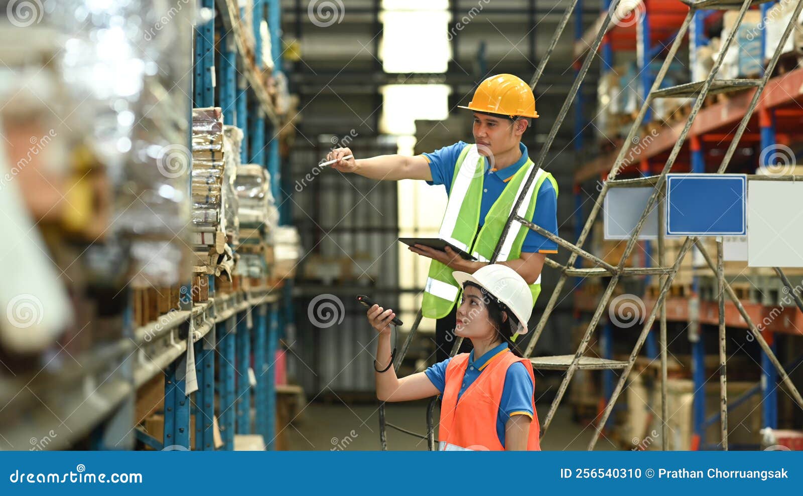 Warehouse Workers Checking Inventory Boxes with Barcode Scanner on ...