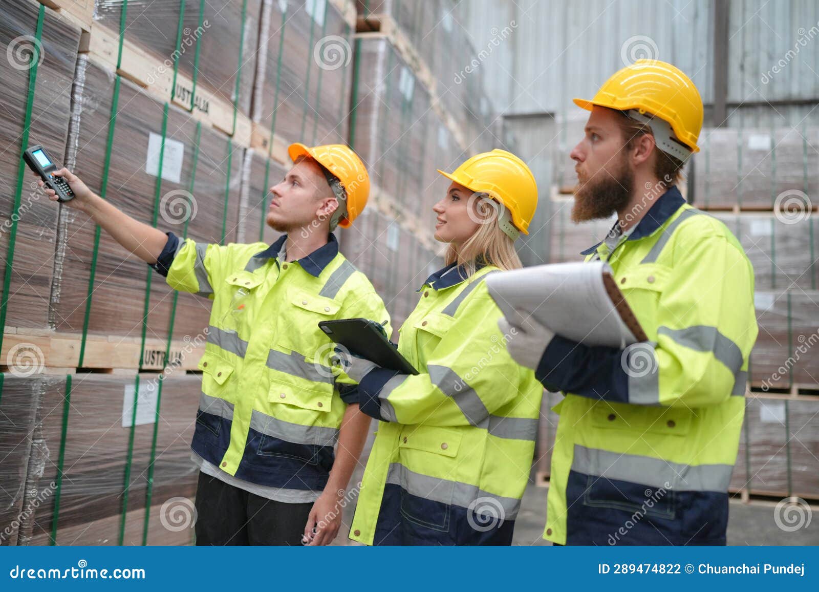 Warehouse Workers Checking Inventory in a Large Distrubiton Warehouse ...