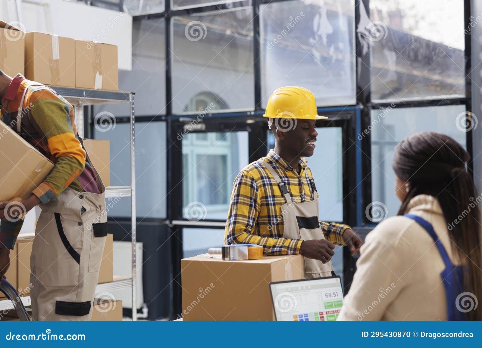 Warehouse Workers Checking Pick Ticket, Preparing Parcel for Shipping ...
