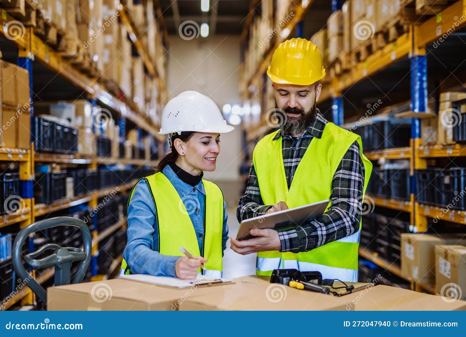 Warehouse Workers Checking Stuff in Warehouse with Digital System in ...