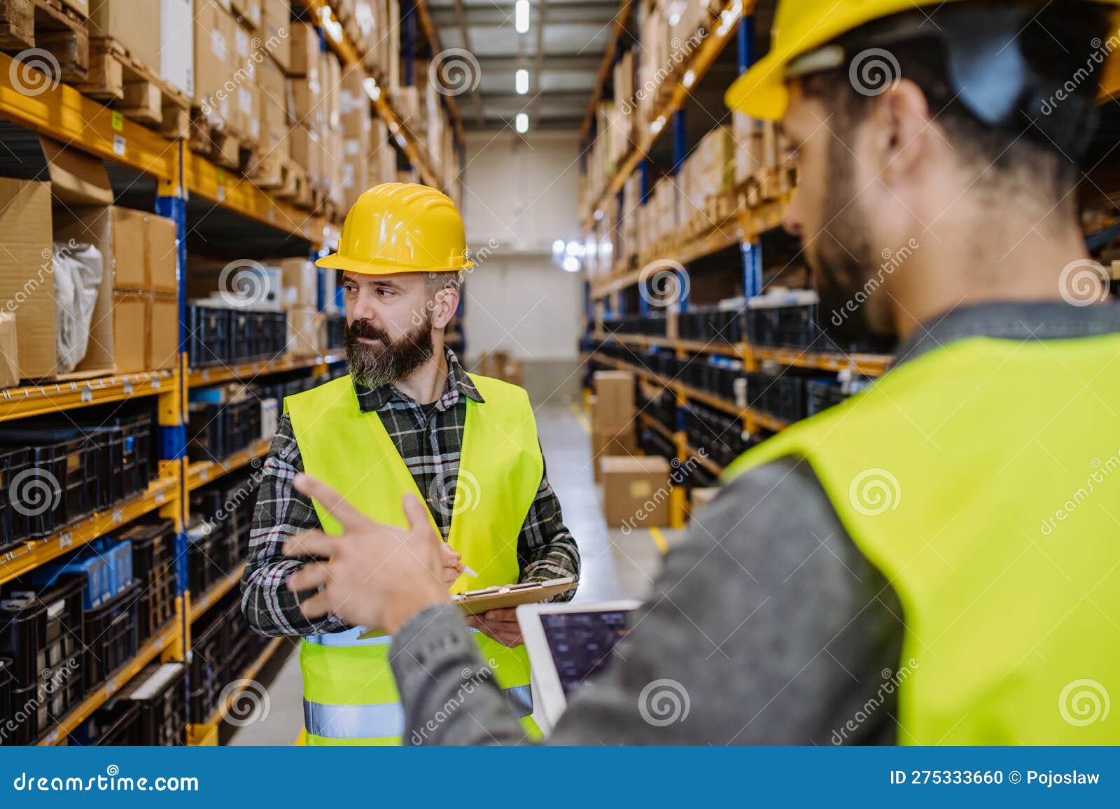 Warehouse Workers Checking Stuff in Warehouse with Digital System in ...